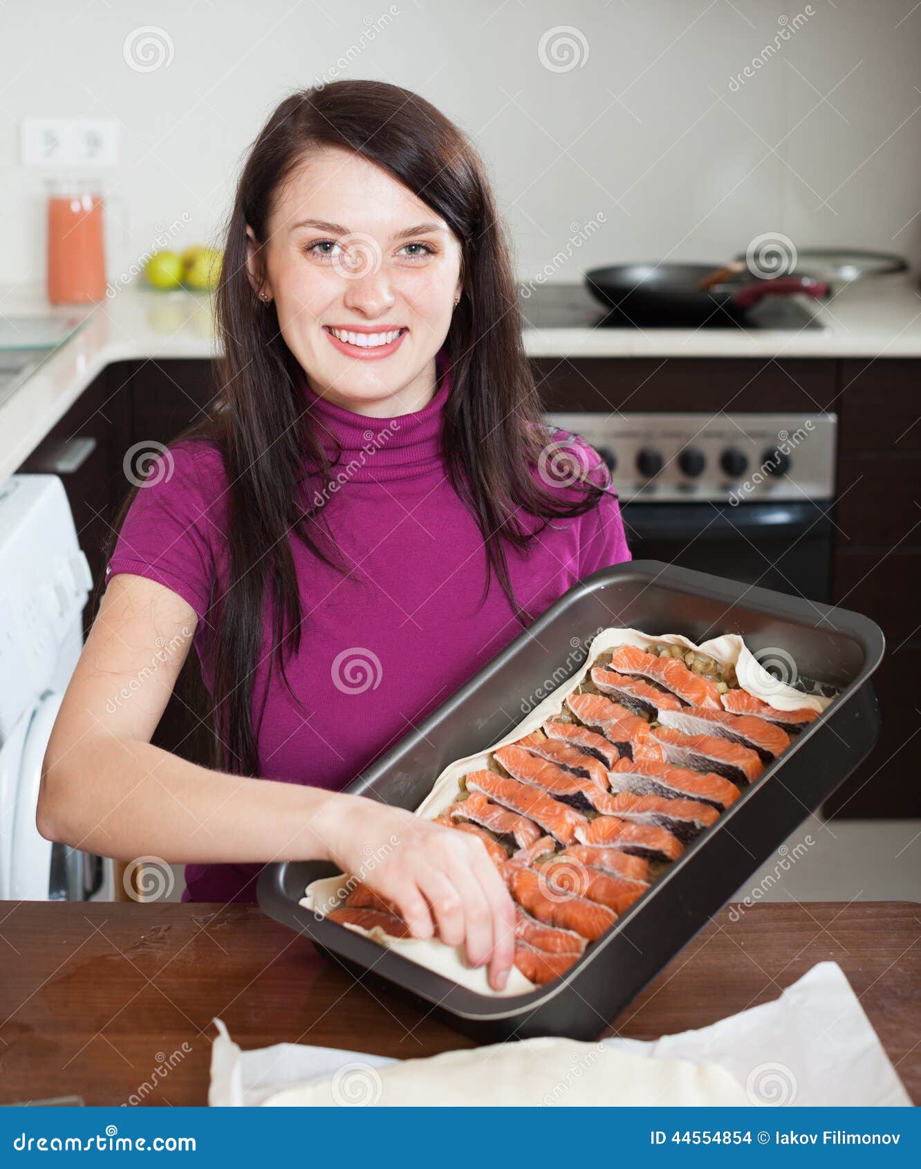 Happy Woman Cooking Fish Pie Stock Photo - Image of prepare, food: 44554854