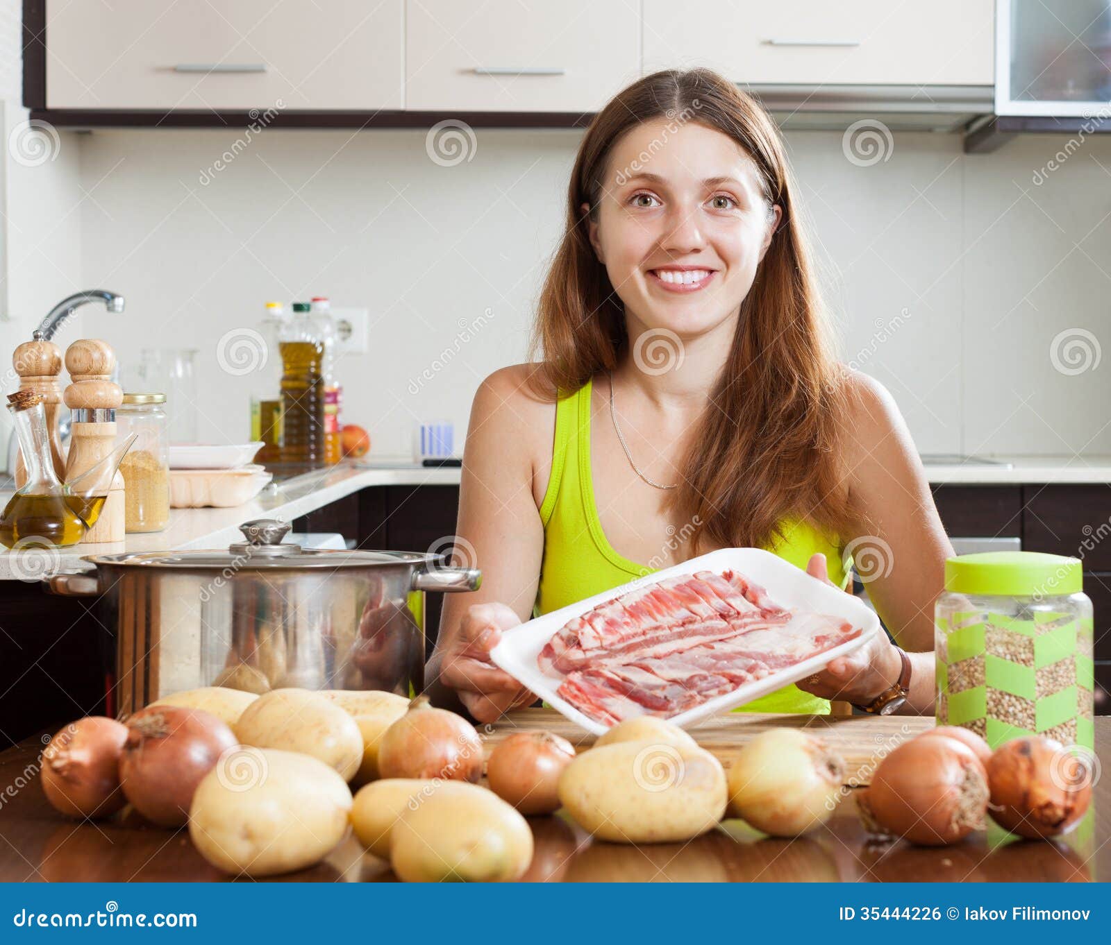 Happy Woman Cooking with Lamb Meat Stock Photo - Image of ribs, female ...