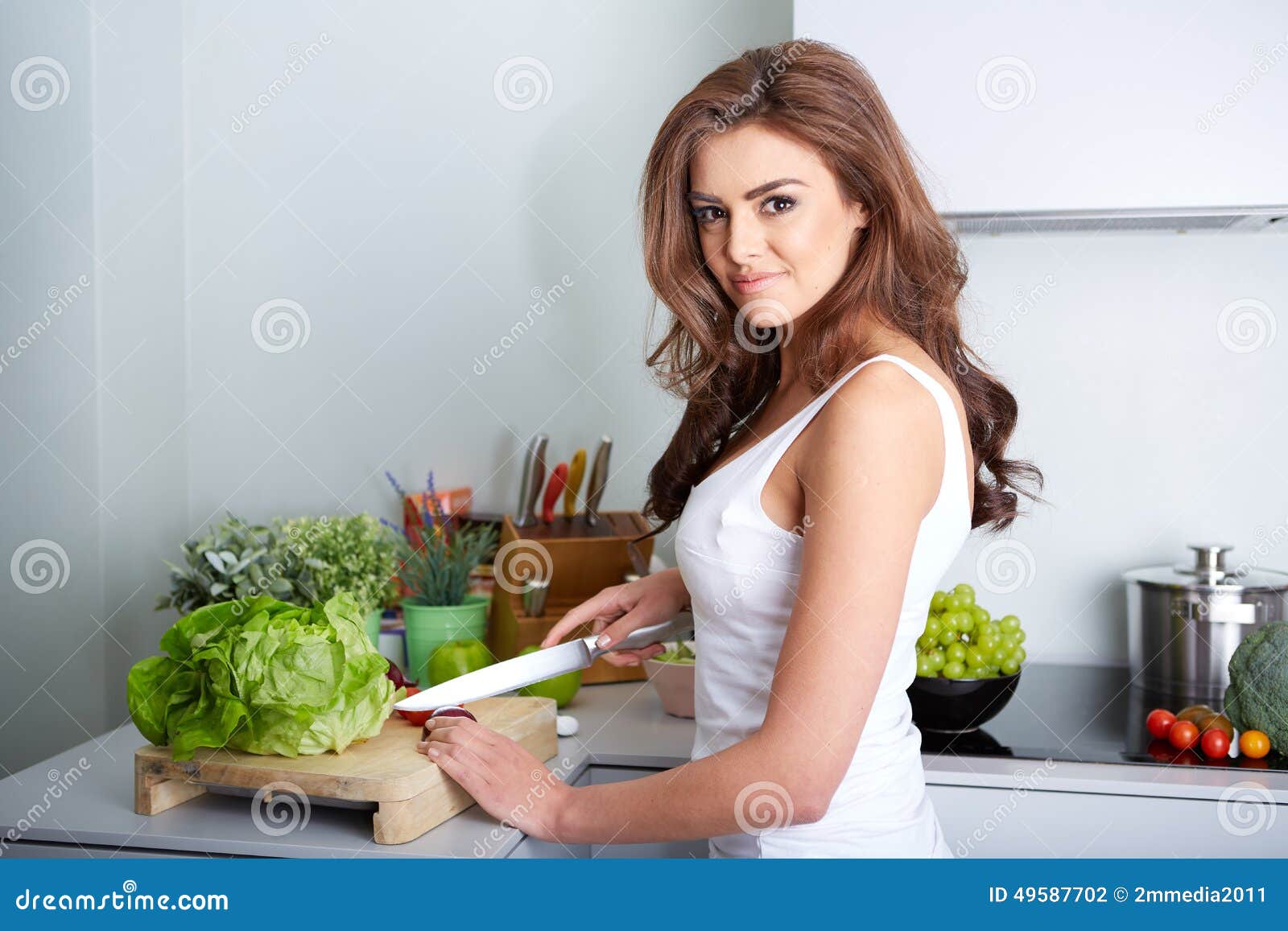 Happy Woman Cooking a Meal in the Kitchen Stock Photo - Image of female ...