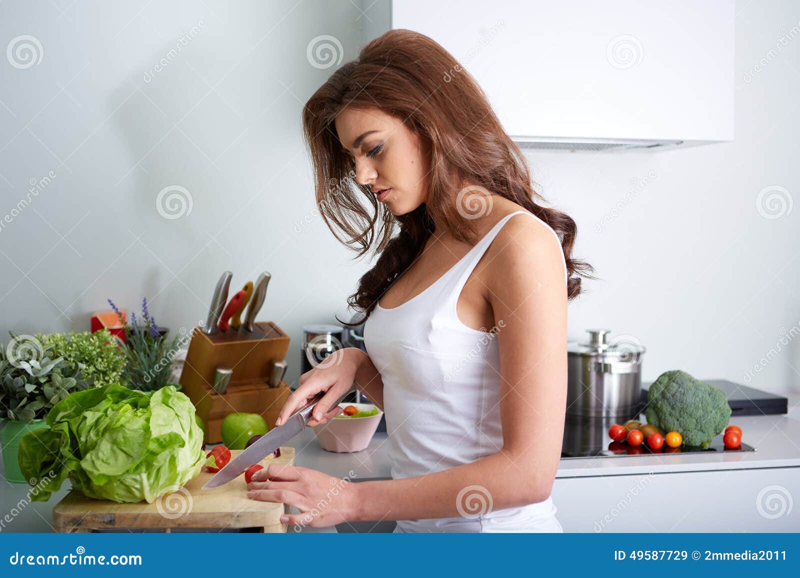 Happy Woman Cooking a Meal in the Kitchen Stock Image - Image of ...