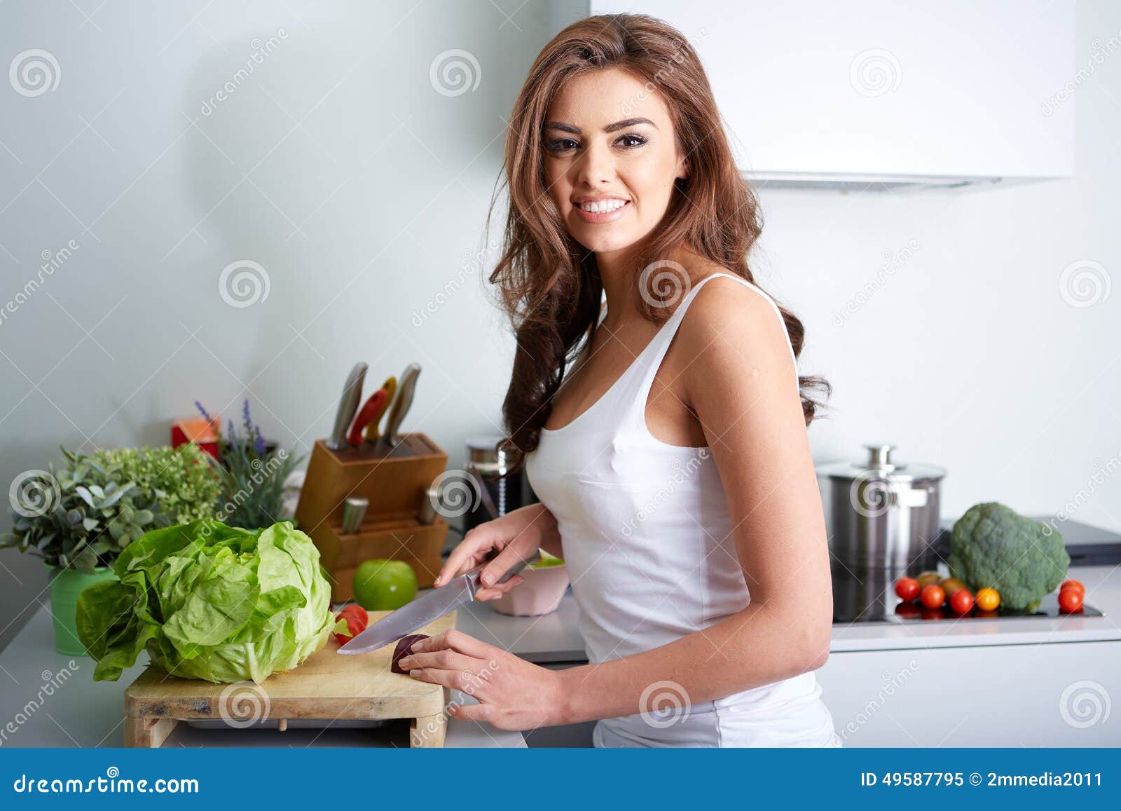 Happy Woman Cooking a Meal in the Kitchen Stock Image - Image of mother ...