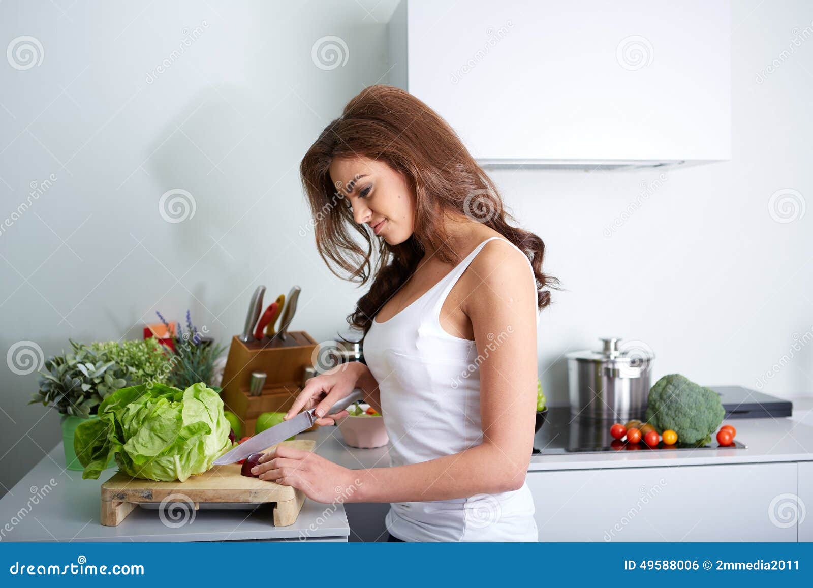 Happy Woman Cooking a Meal in the Kitchen Stock Photo - Image of mother ...