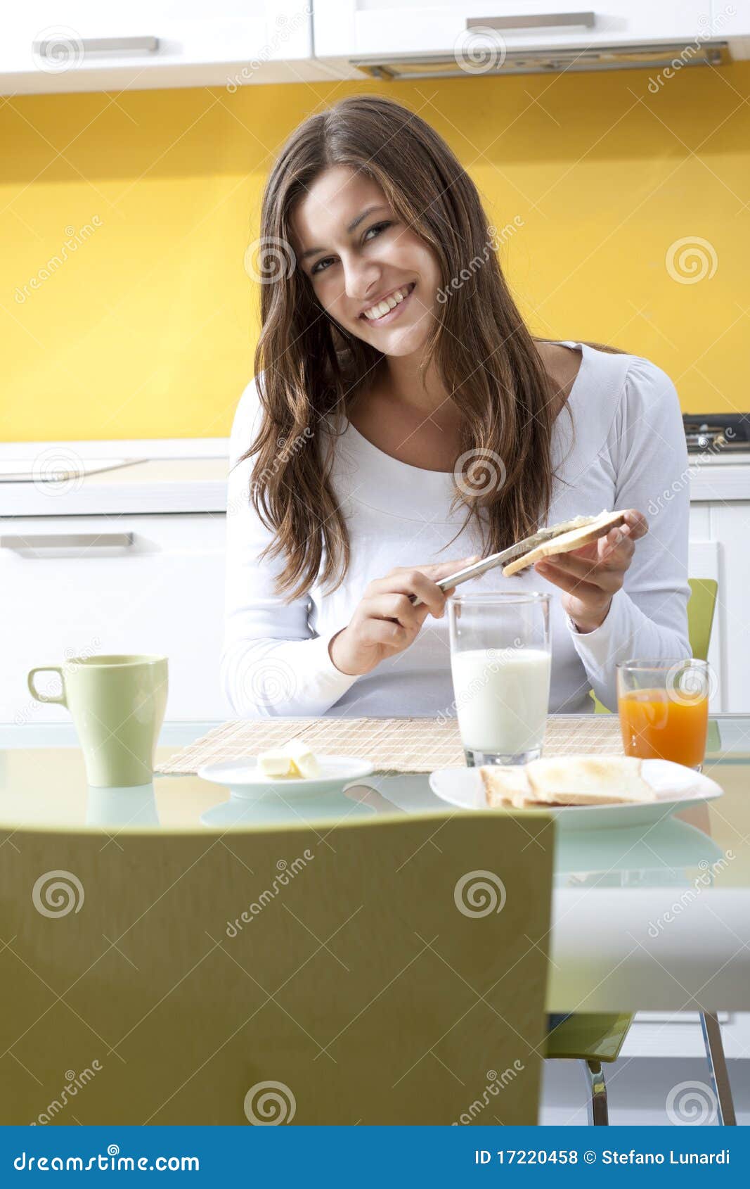 Happy Woman Doing Breakfast Stock Photo - Image of holding, eating ...