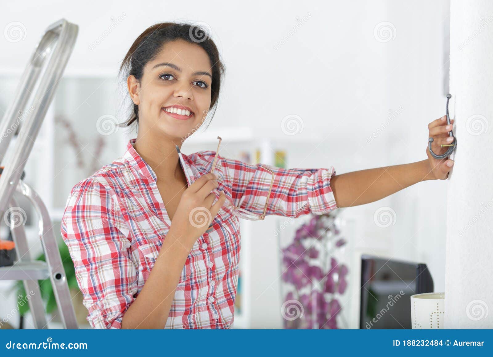 Happy woman doing diy stock photo. Image of renovating - 188232484