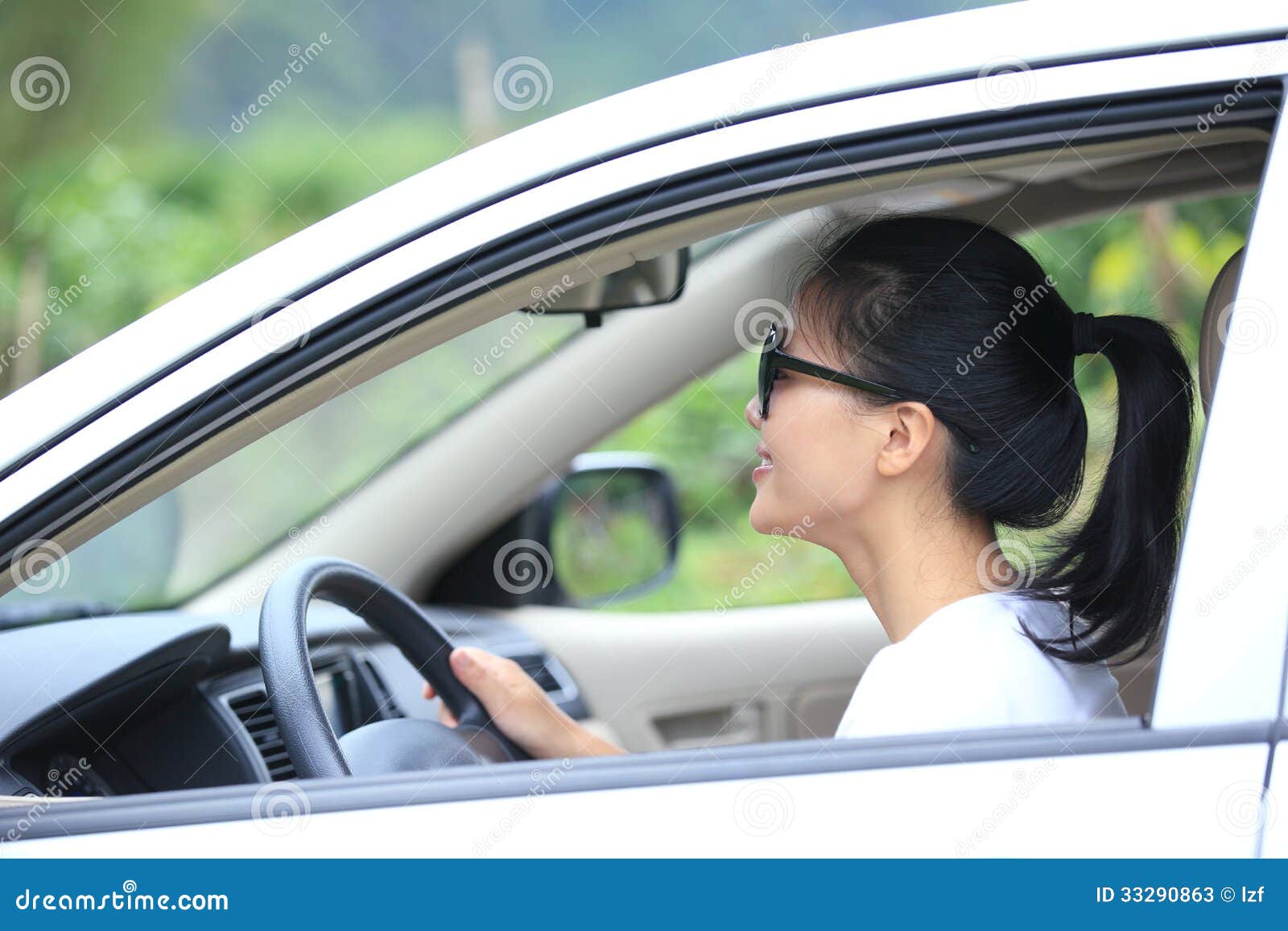 Happy woman driving car stock image. Image of pretty - 33290863