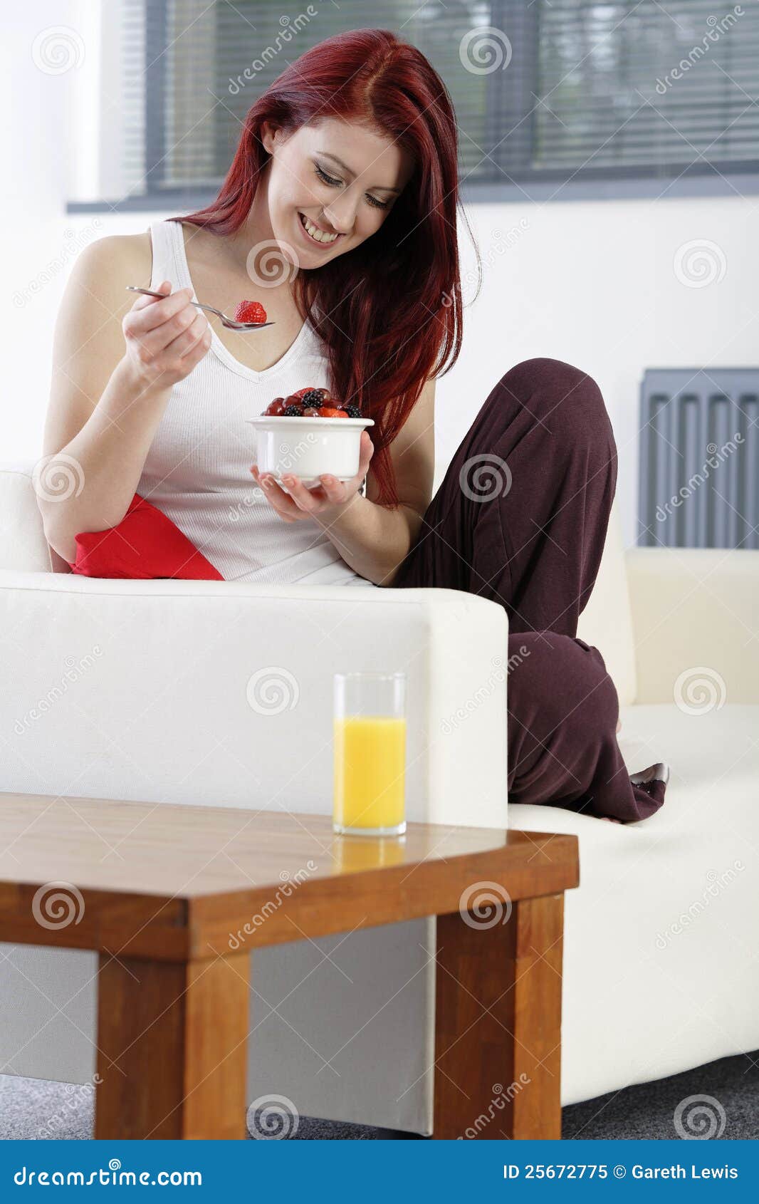 Happy Woman Eating Breakfast Stock Image - Image of cheerful, woman ...