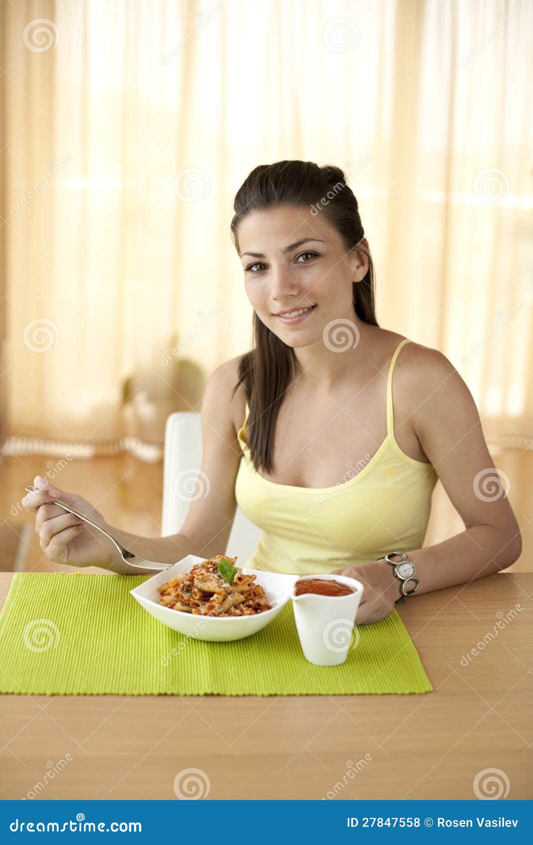 Happy woman eating pasta stock photo. Image of delicious - 27847558
