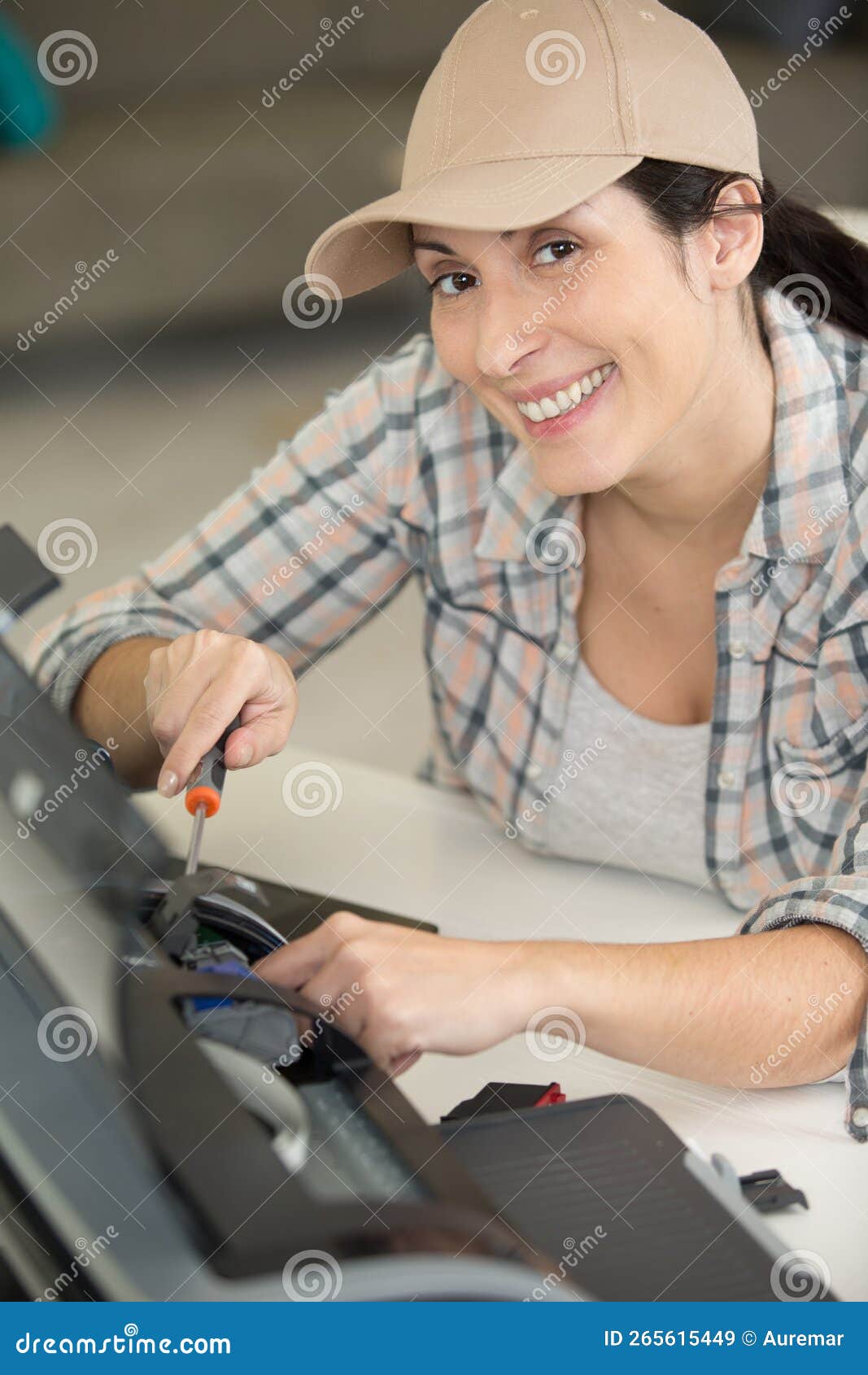 Happy woman fixing printer stock image. Image of fixing - 265615449