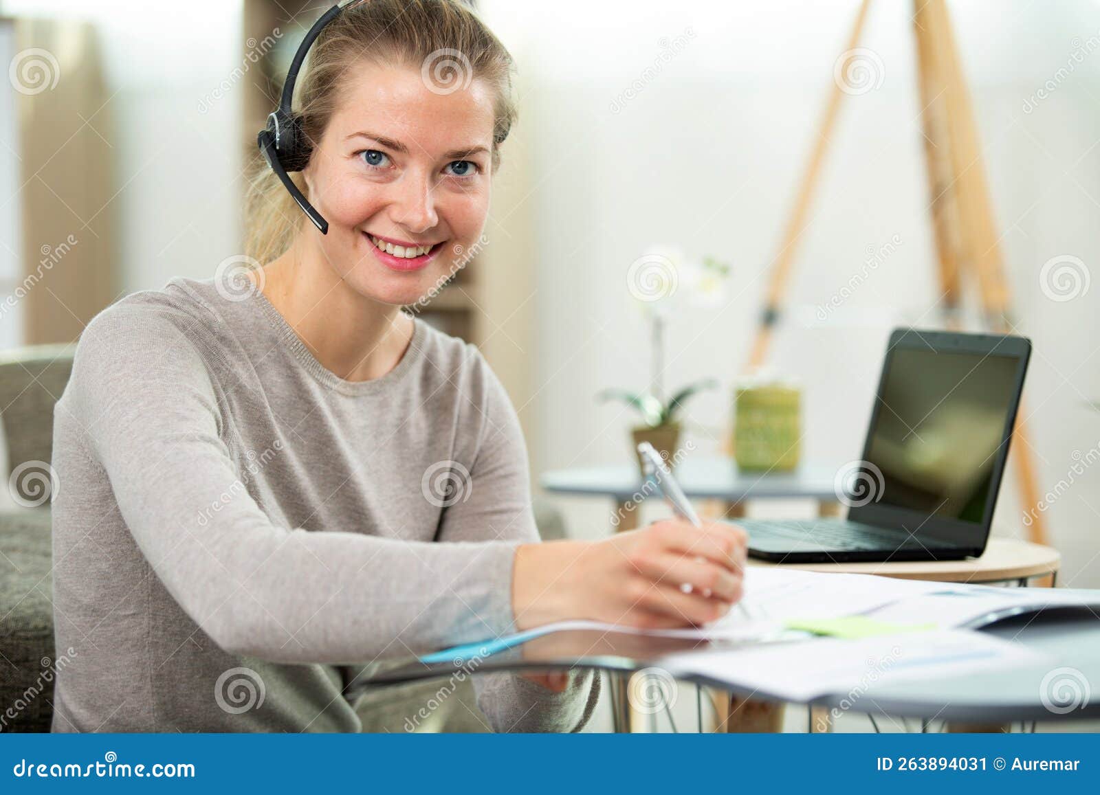 Happy Woman with Headset Working on Laptop Computer Stock Image - Image ...