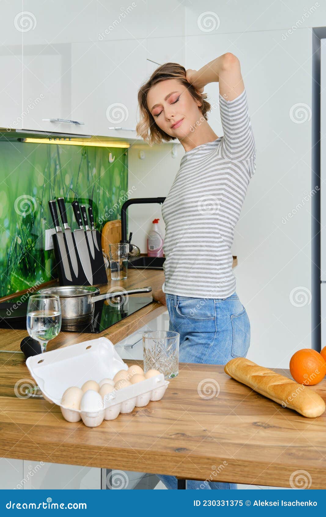 Happy woman in the kitchen stock image. Image of caucasian - 230331375