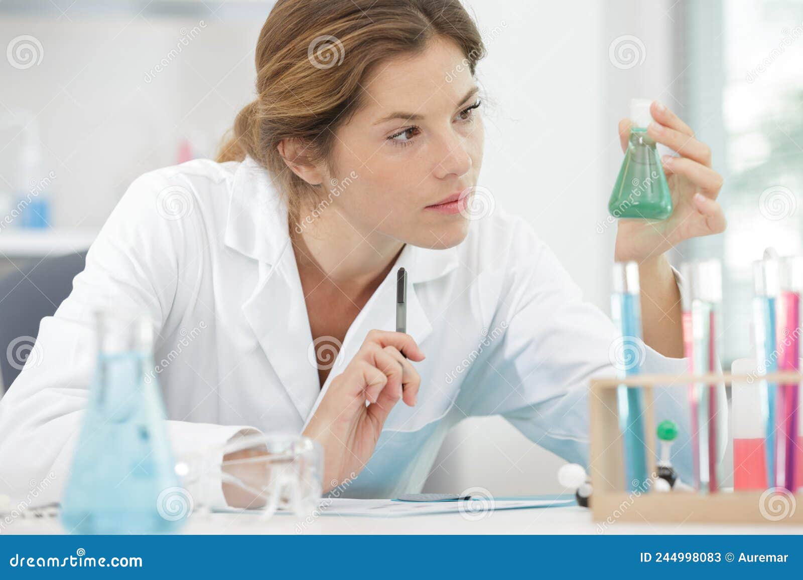 Happy woman in lab stock image. Image of microbiology - 244998083