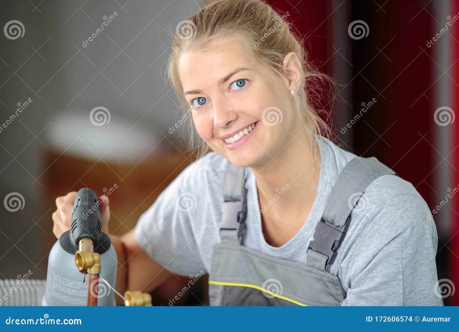 Happy Woman Laborer Smiling Stock Photo - Image of water, vocational ...