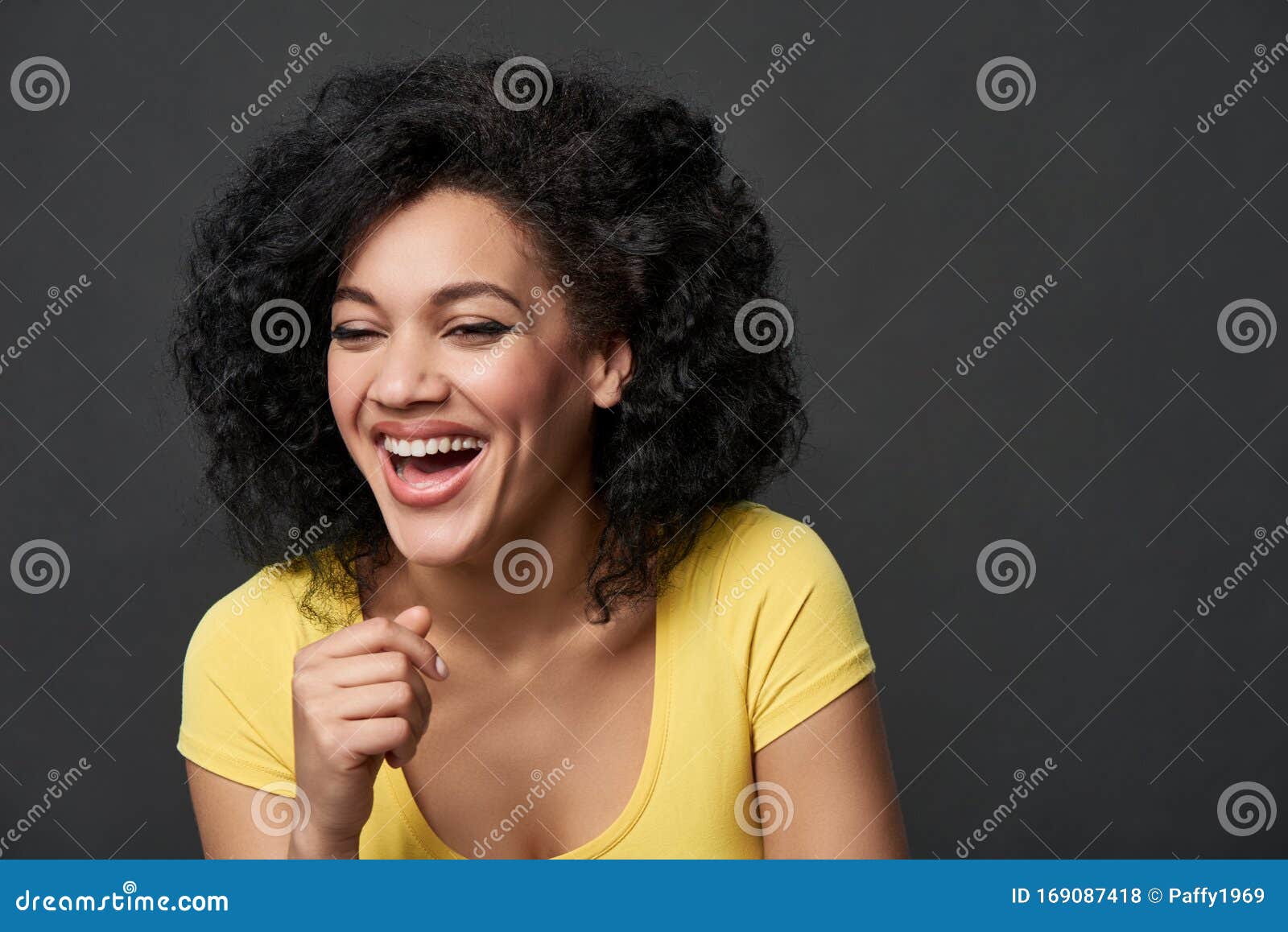 Happy woman laughing stock photo. Image of expressive - 169087418