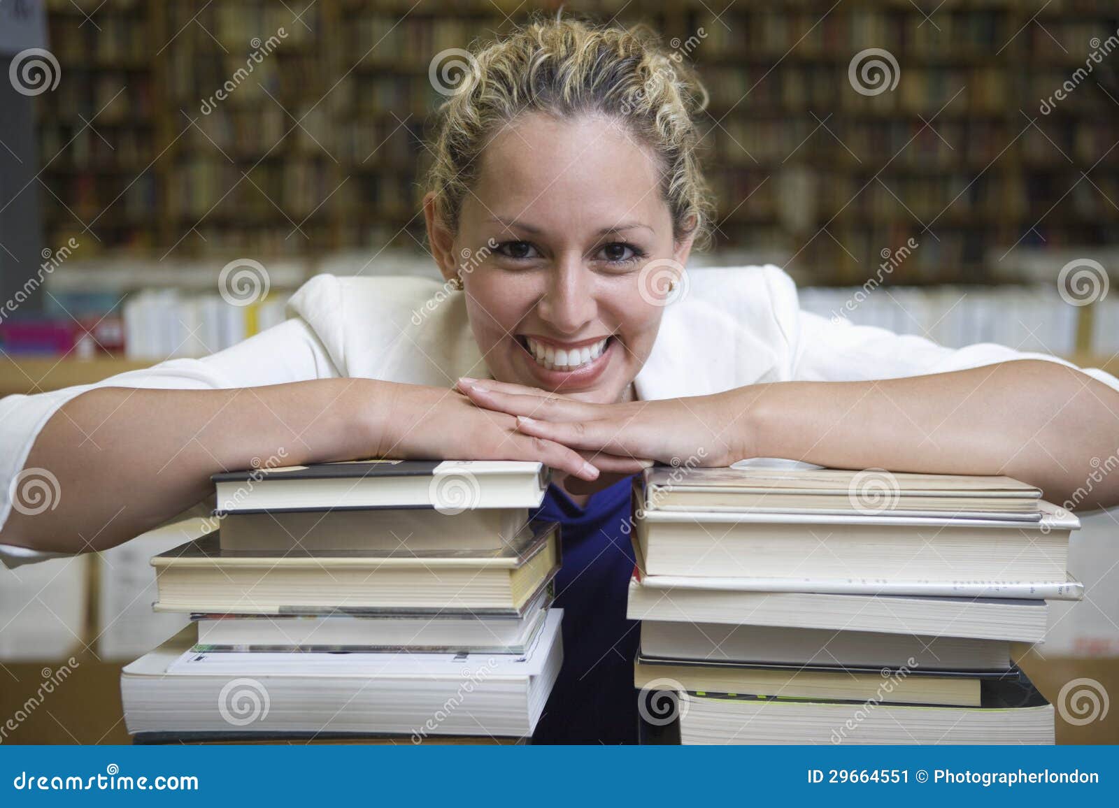 Happy Woman Leaning on Stack of Books Stock Image - Image of library ...