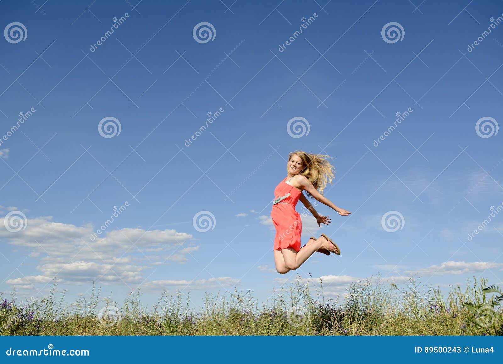 Happy woman leaping stock image. Image of jump, bounce - 89500243