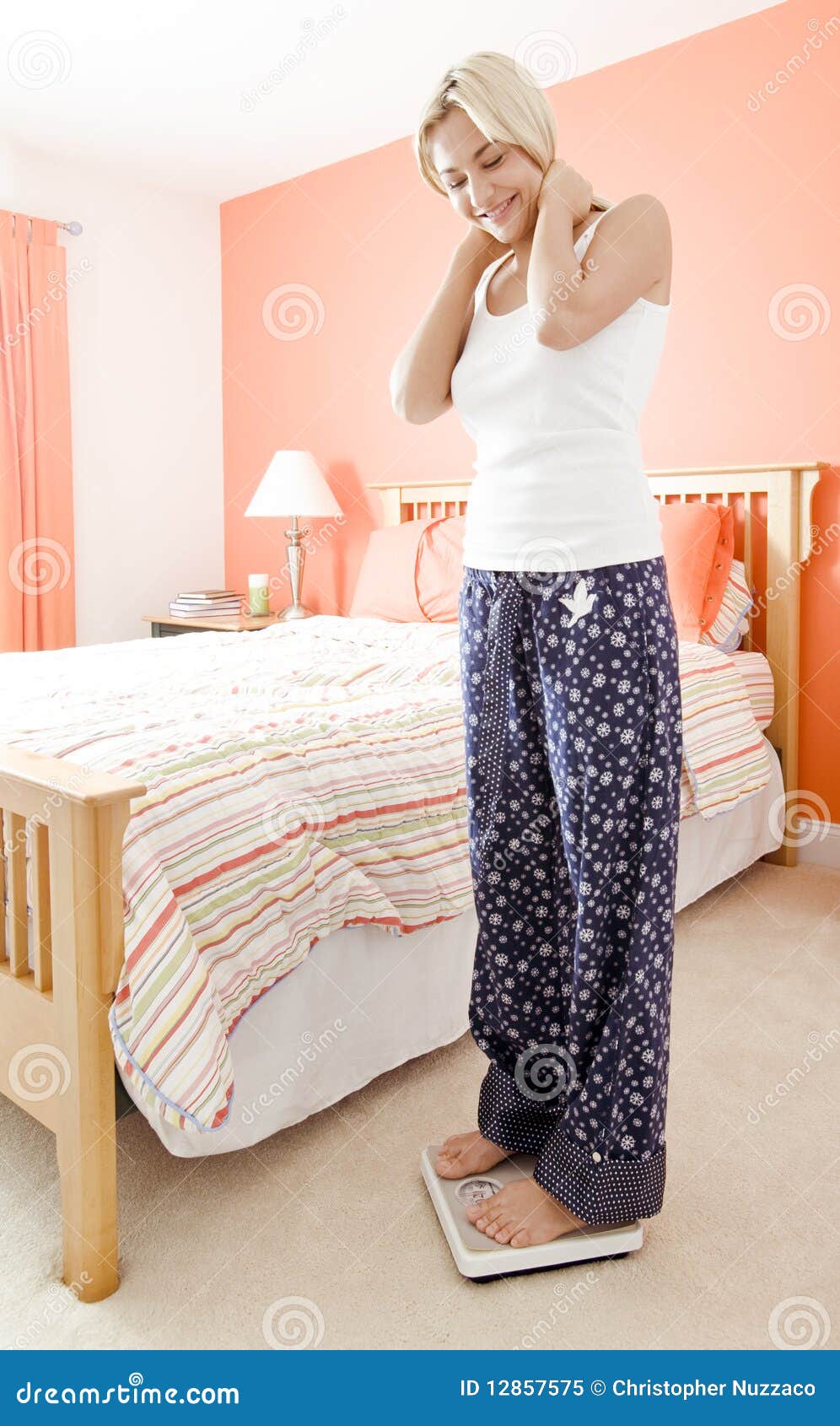 Happy Woman Looking Down at Scale Stock Image - Image of confidence ...