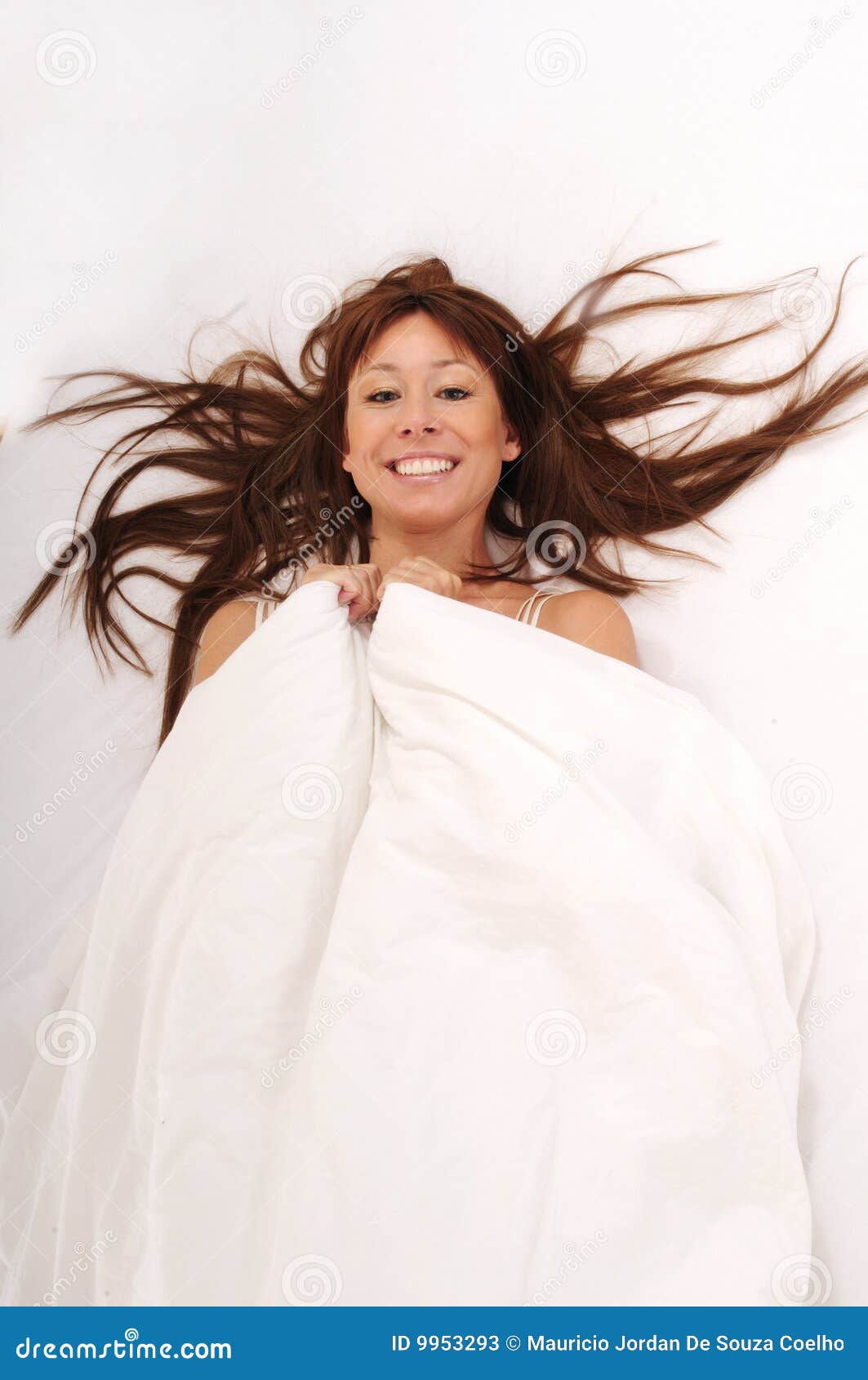 Happy woman lying in bed stock image. Image of lying, blanket - 9953293
