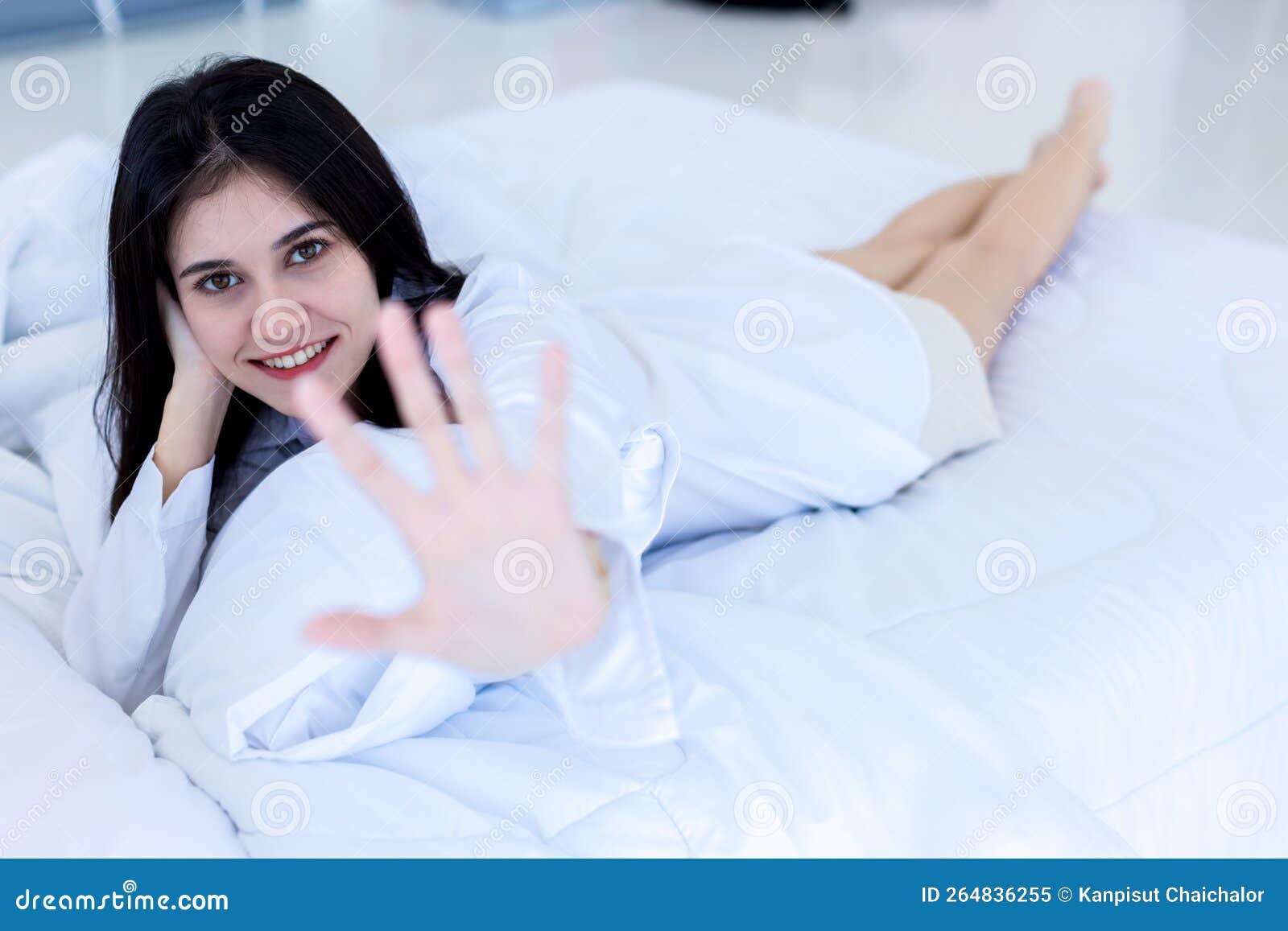 Happy Woman Lying on Bed. Woman Having a Rest in Her Comfortable Bed ...