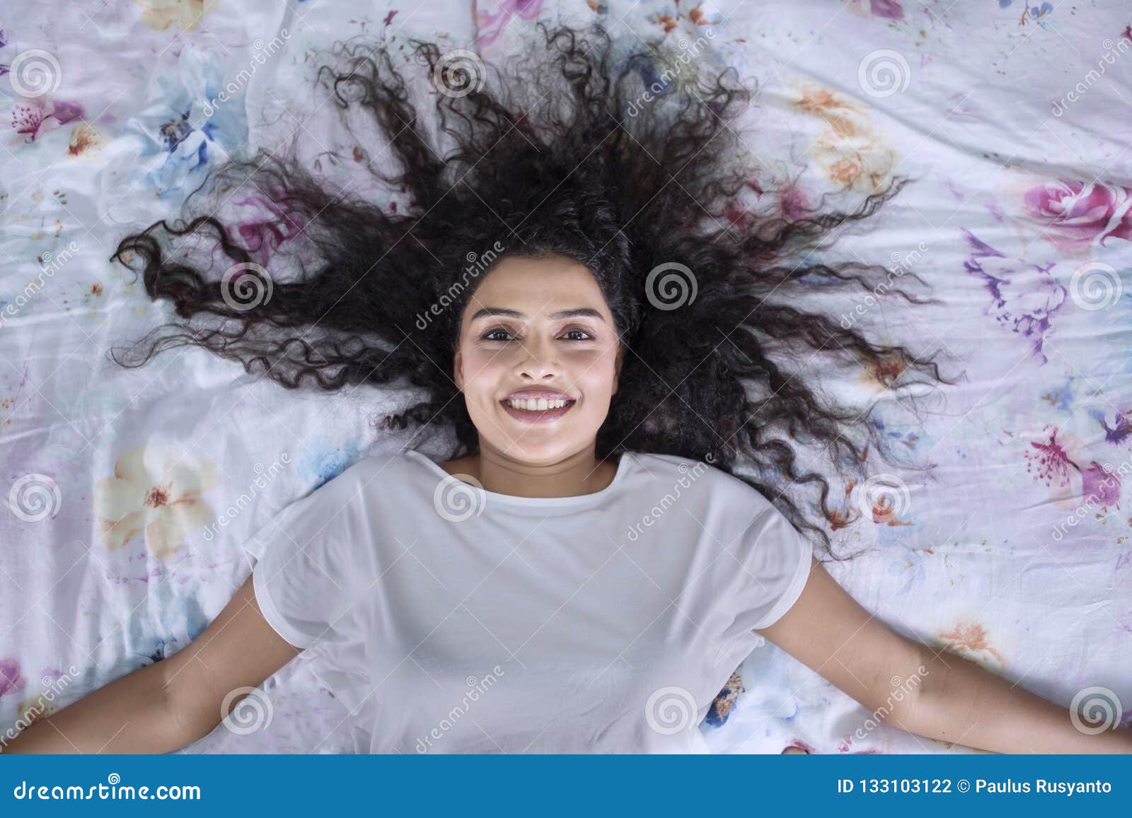 Happy Woman Lying on the Bed Stock Photo - Image of morning, portrait ...