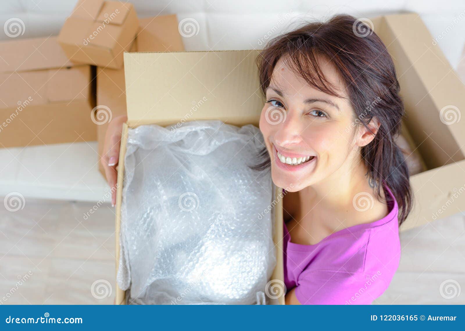 Happy woman moving house stock image. Image of home - 122036165