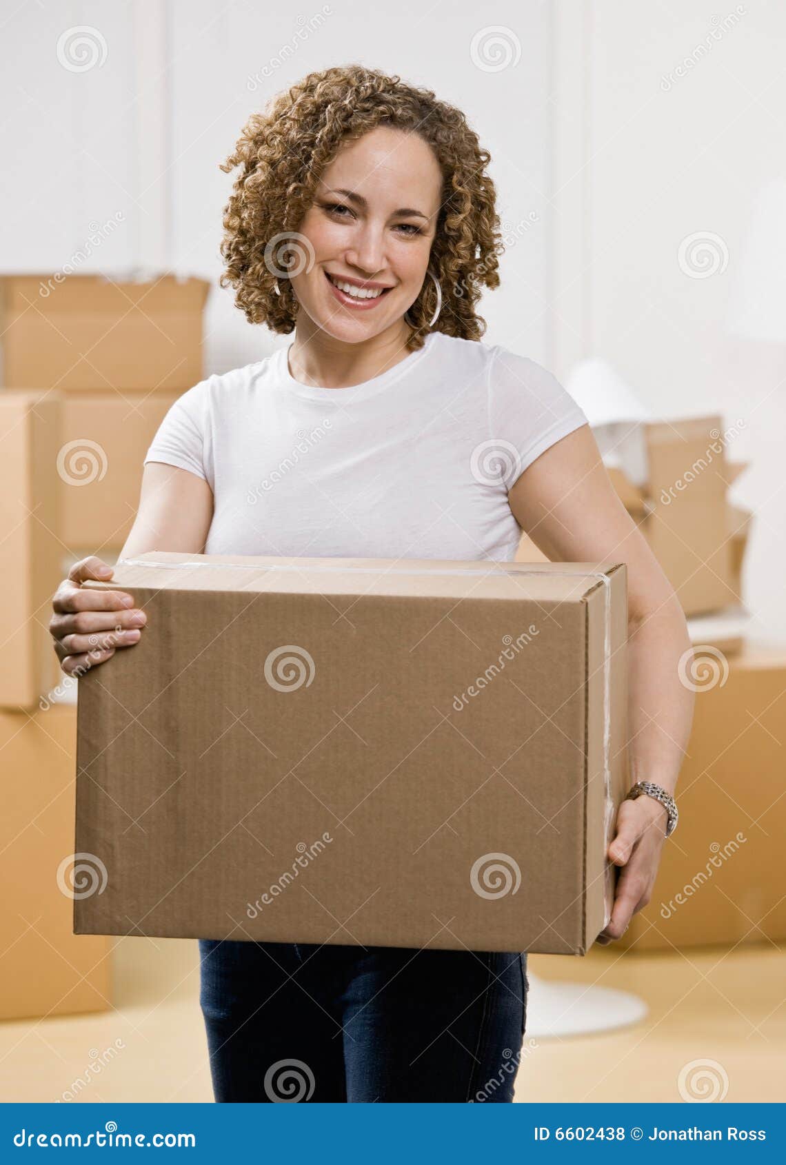 Happy Woman Moving into New Home Stock Photo - Image of happy, adult ...