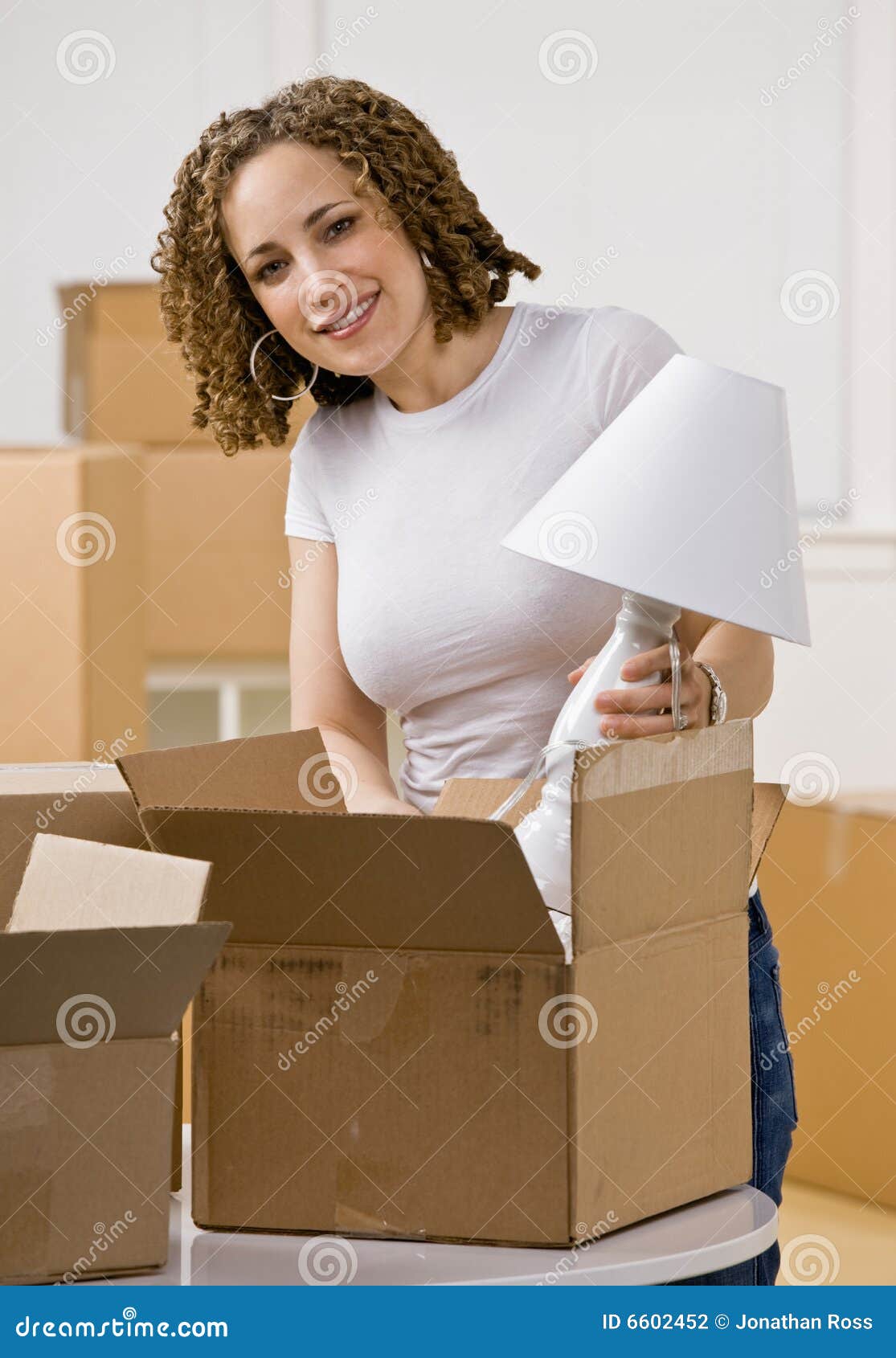 Happy Woman Moving into New Home Stock Photo - Image of person ...