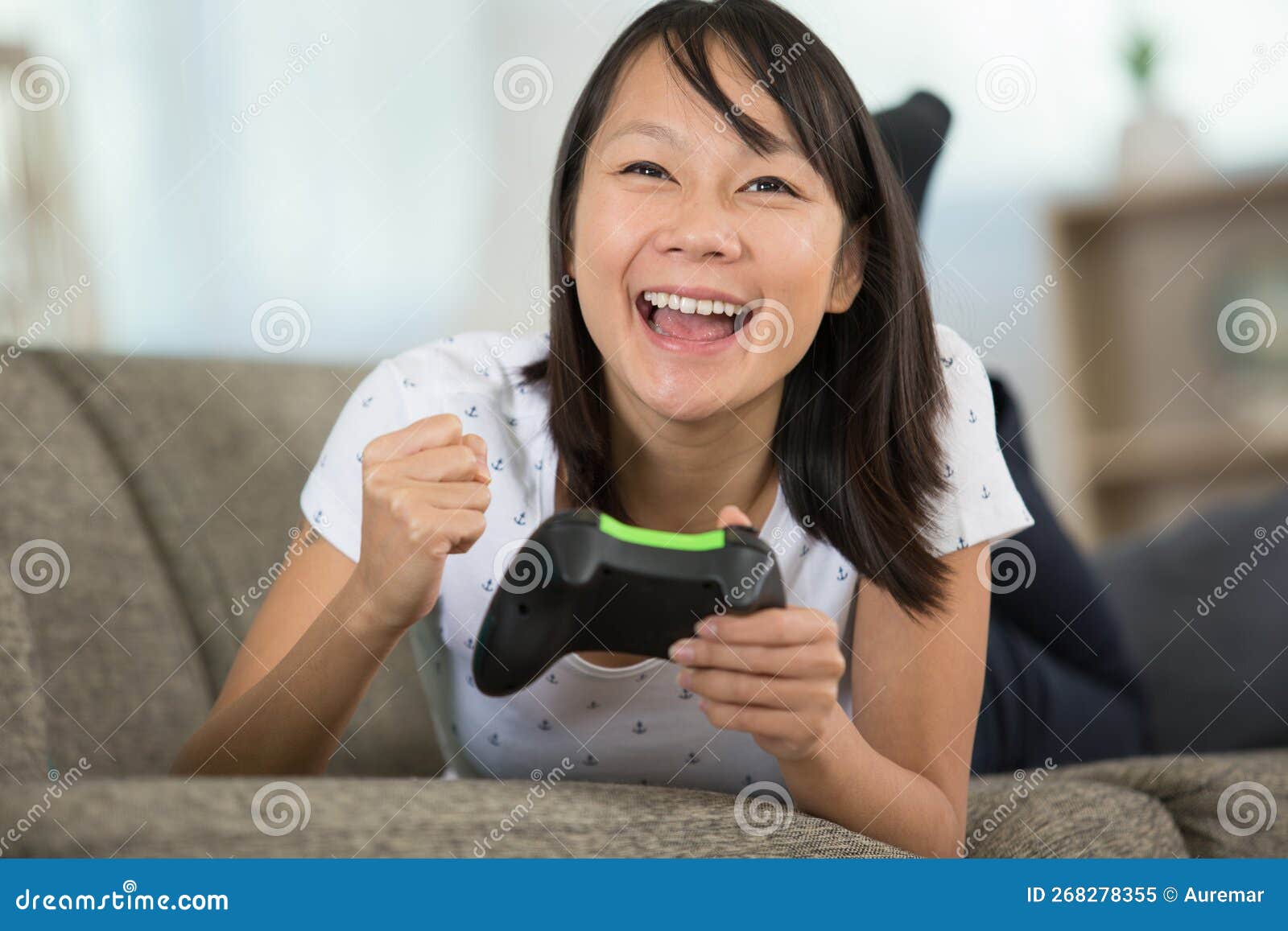 Happy Woman Playing Video Games Holding Controller Stock Image - Image ...