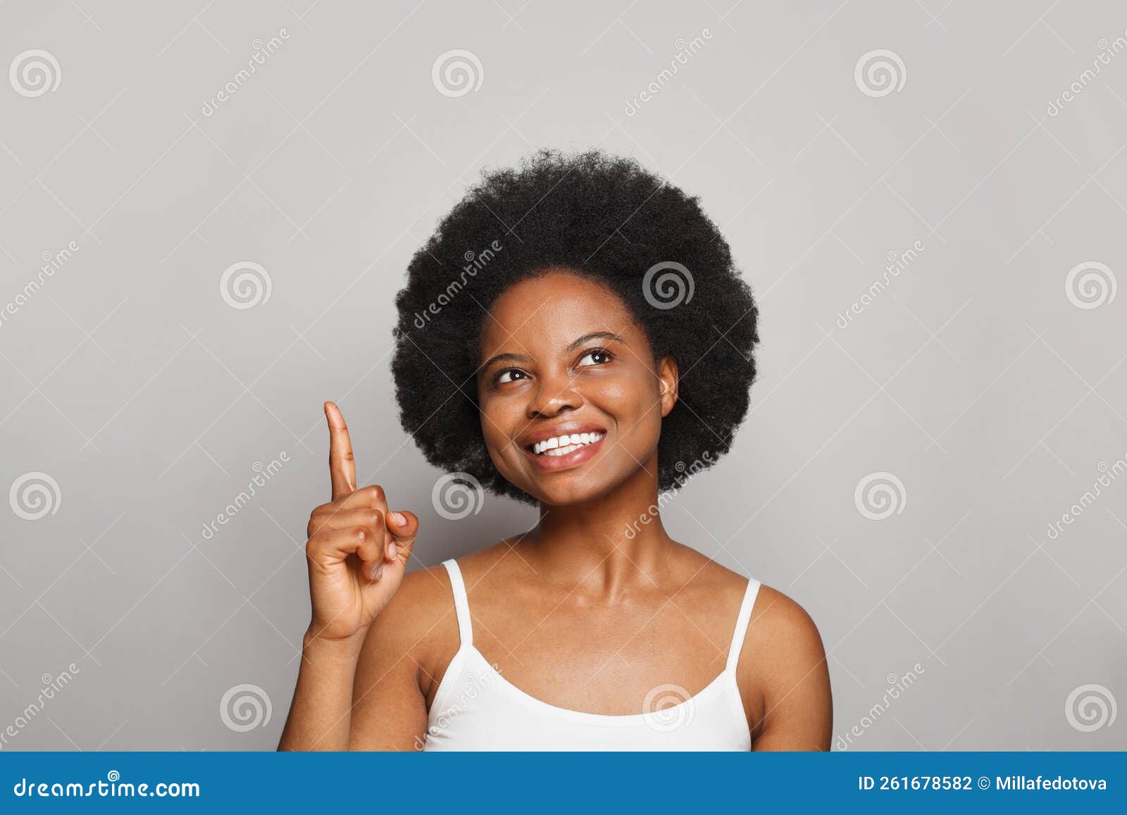 Happy Woman Pointing Finger Up on White Background Stock Photo - Image ...