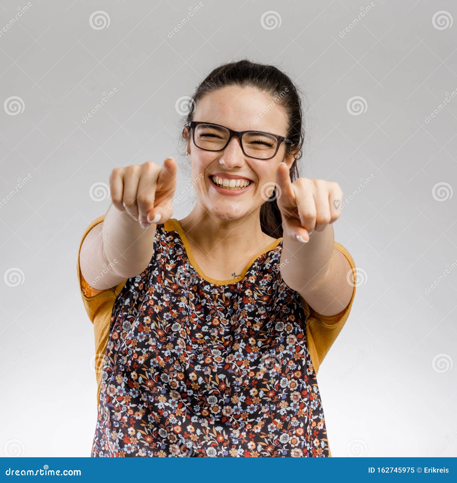Happy woman pointing stock image. Image of model, casual - 162745975