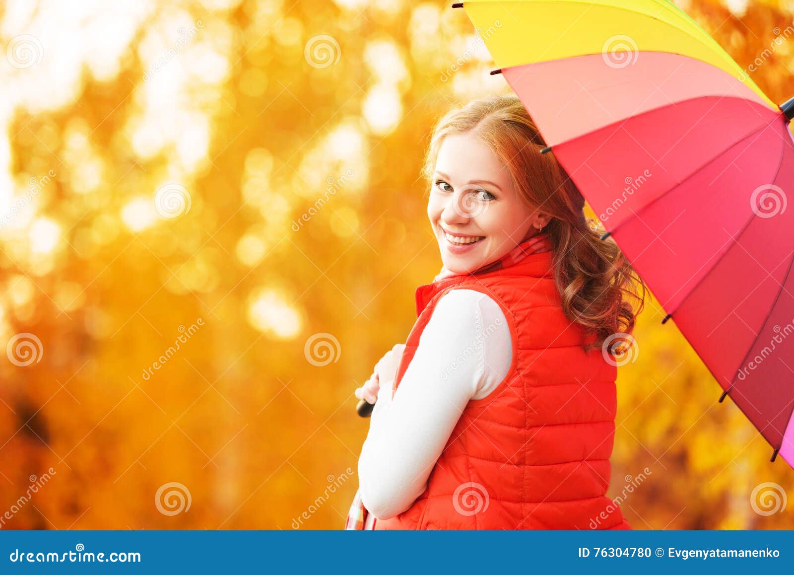Happy Woman With Rainbow Multicolored Umbrella Under Rain In Par Stock