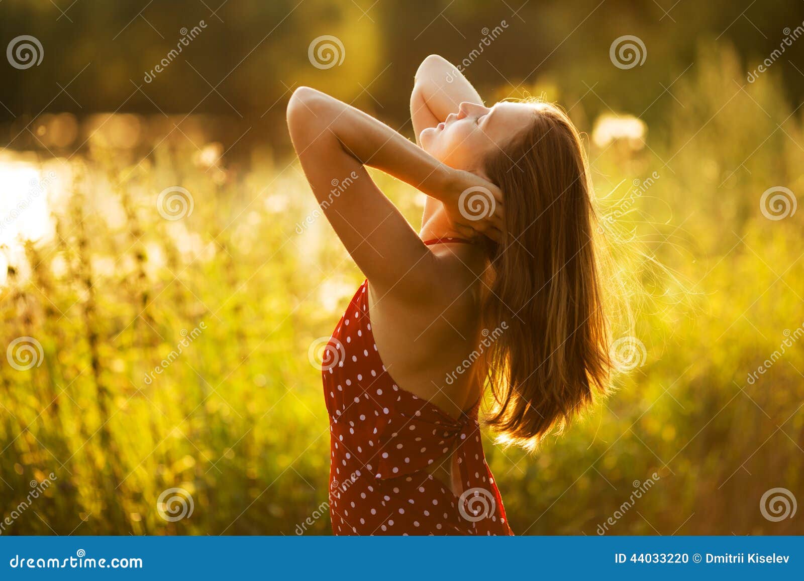 Happy Woman in the Rays of the Evening Sun Stock Photo - Image of dream ...