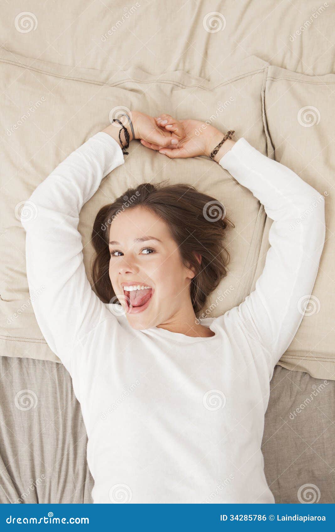 Happy Woman Resting on the Bed Stock Photo - Image of female, lying ...