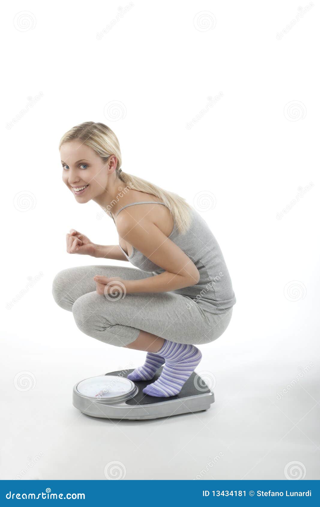 Happy woman on scale stock image. Image of slim, scale - 13434181
