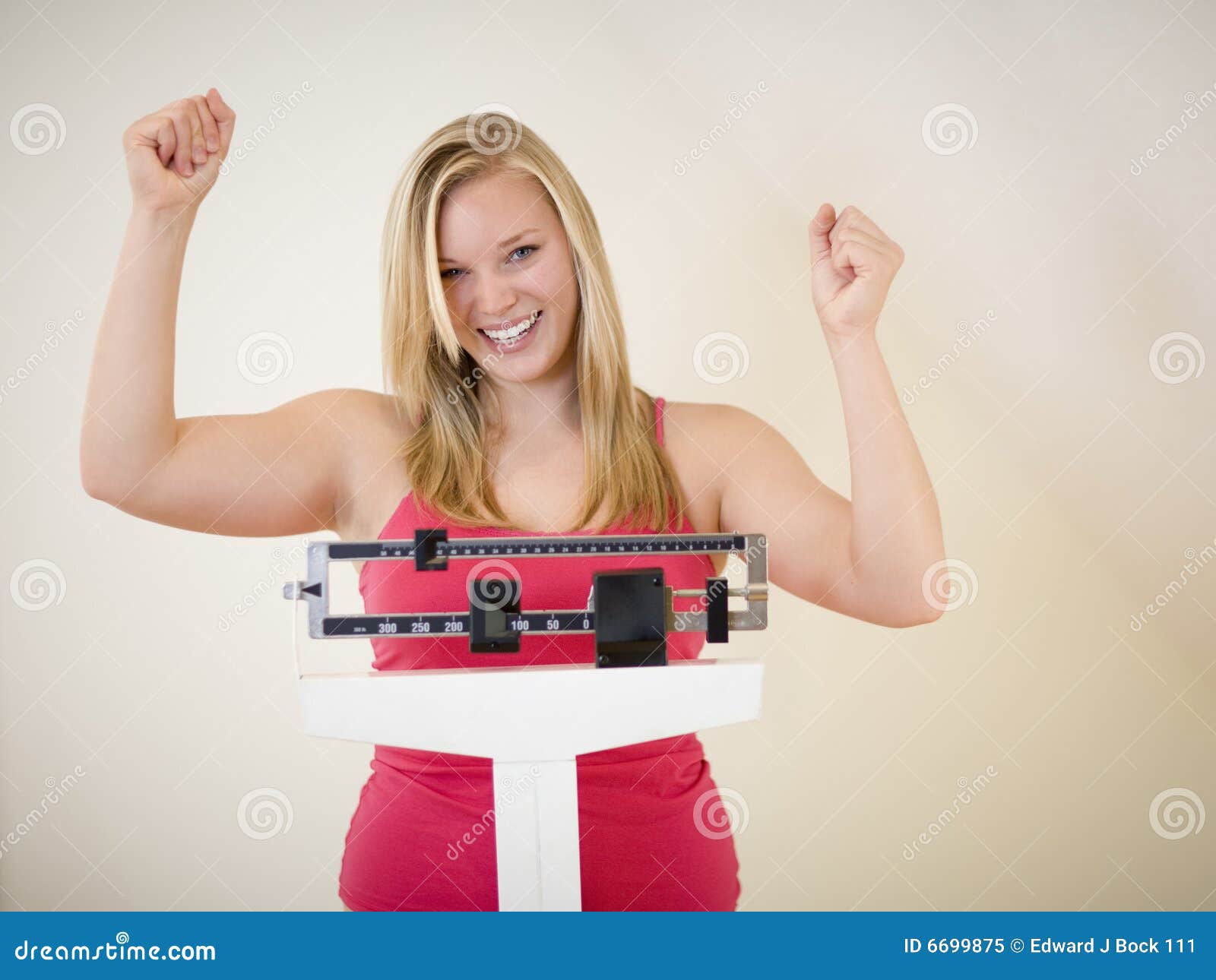 Happy woman on scale stock image. Image of confidence - 6699875