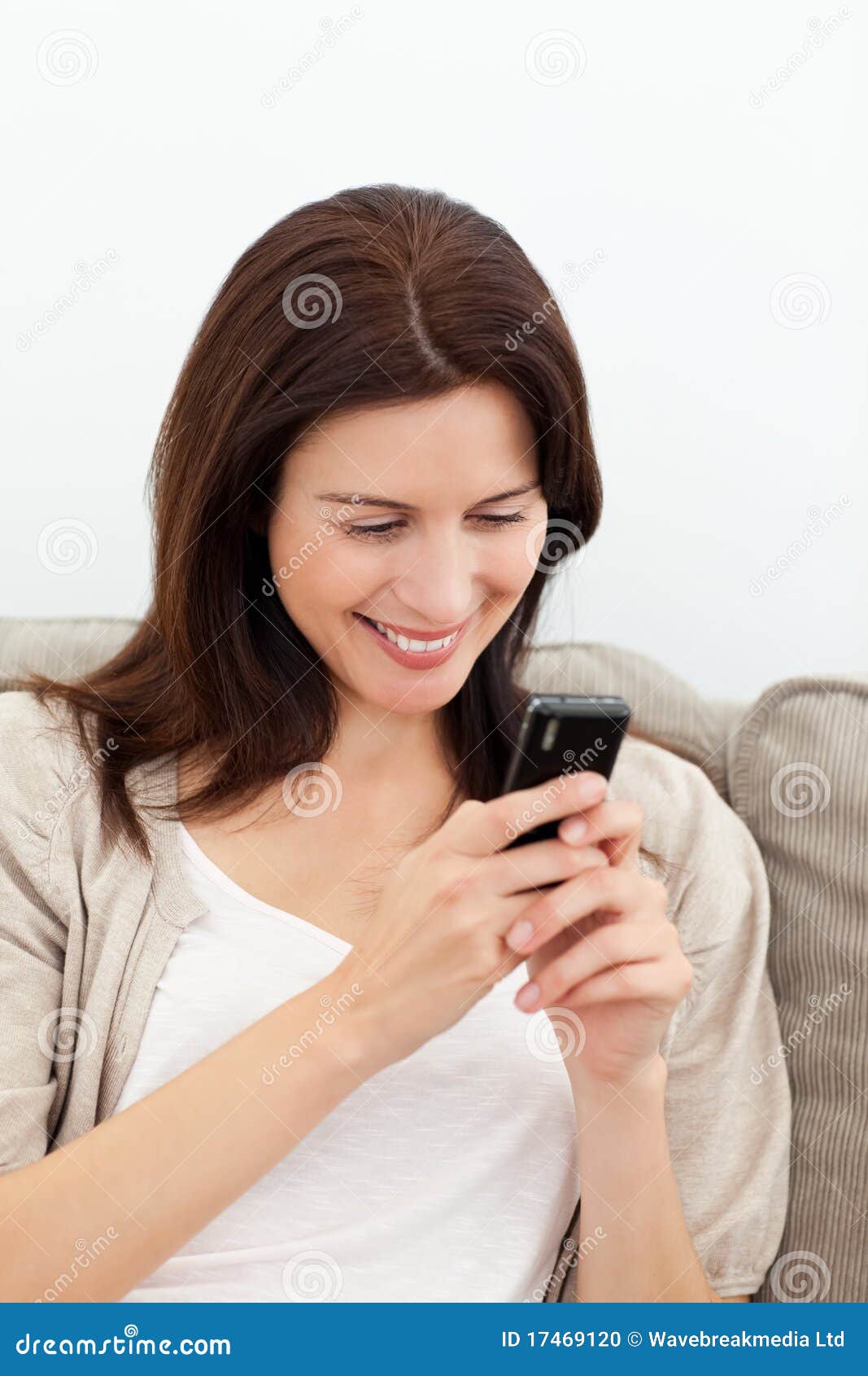 Happy Woman Sending a Message with Her Cellphone Stock Photo - Image of ...