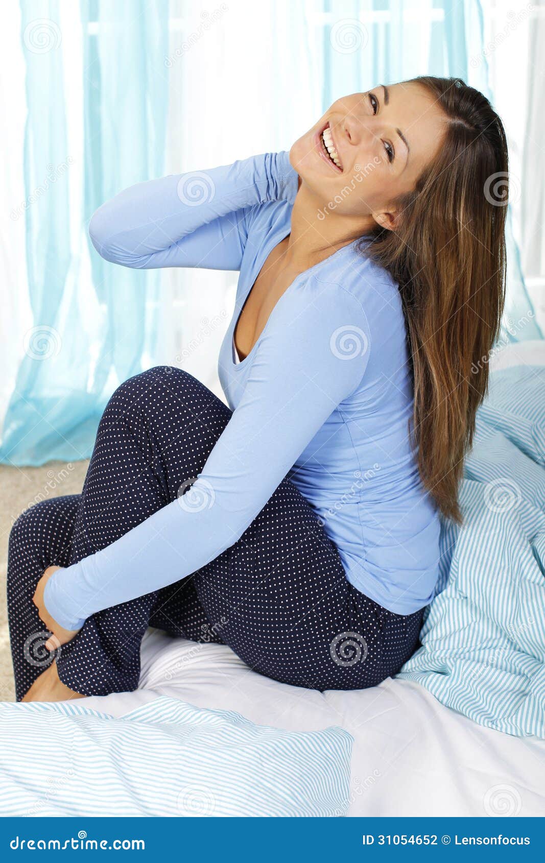 Happy Woman Sits on Her Bed Stock Photo - Image of laugh, smily: 31054652
