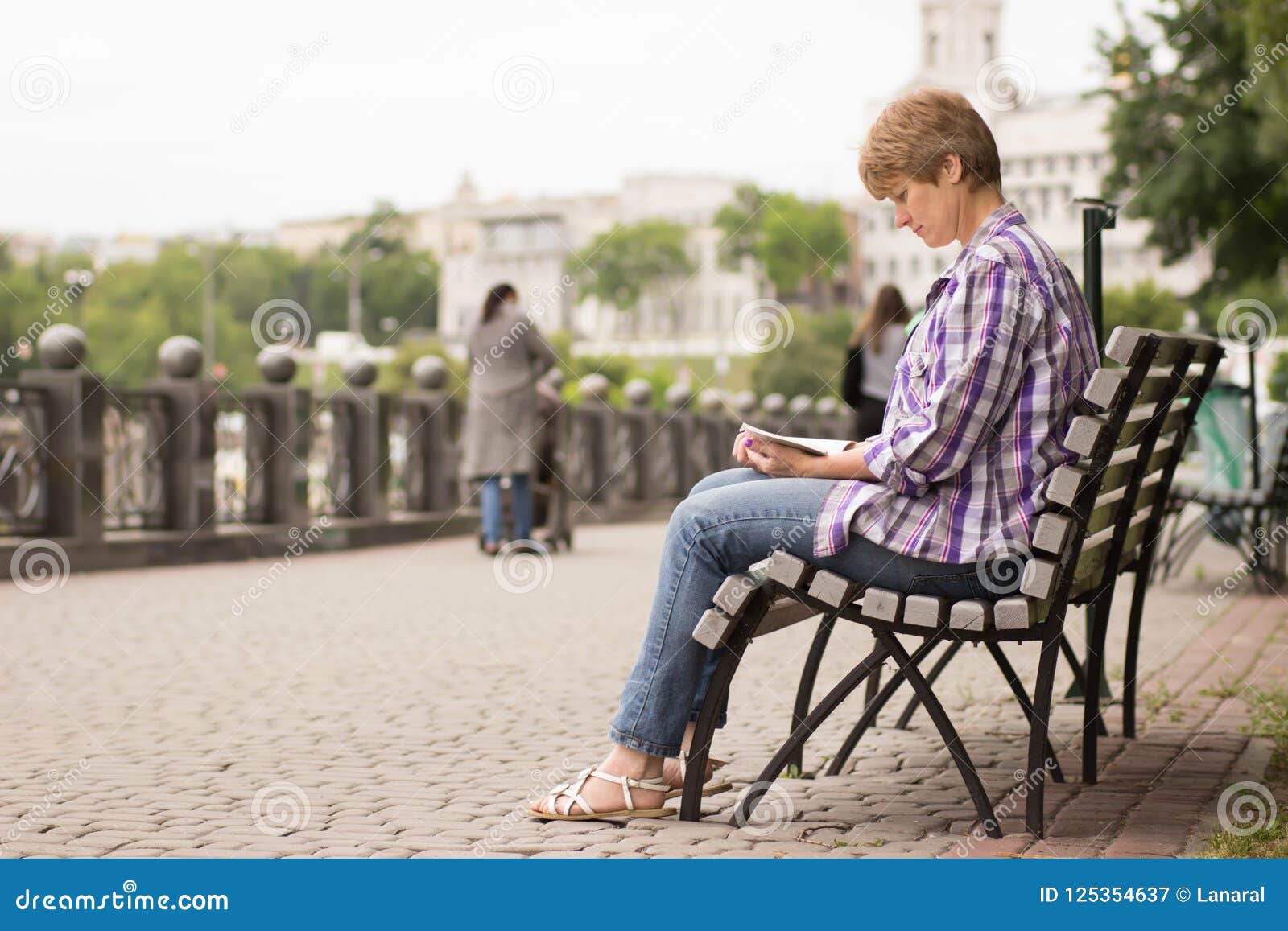 Happy Woman Sitting and Reading a Book Stock Image - Image of reading ...
