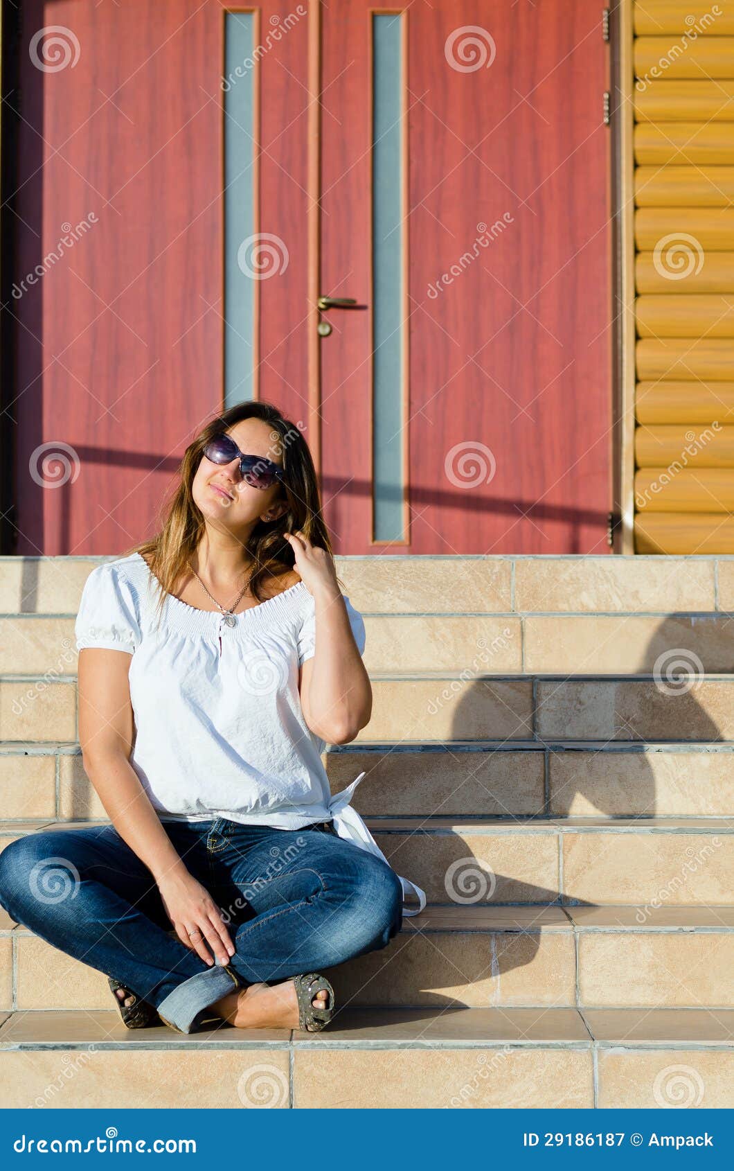 Happy Woman Sitting on Steps Stock Image - Image of door, real: 29186187