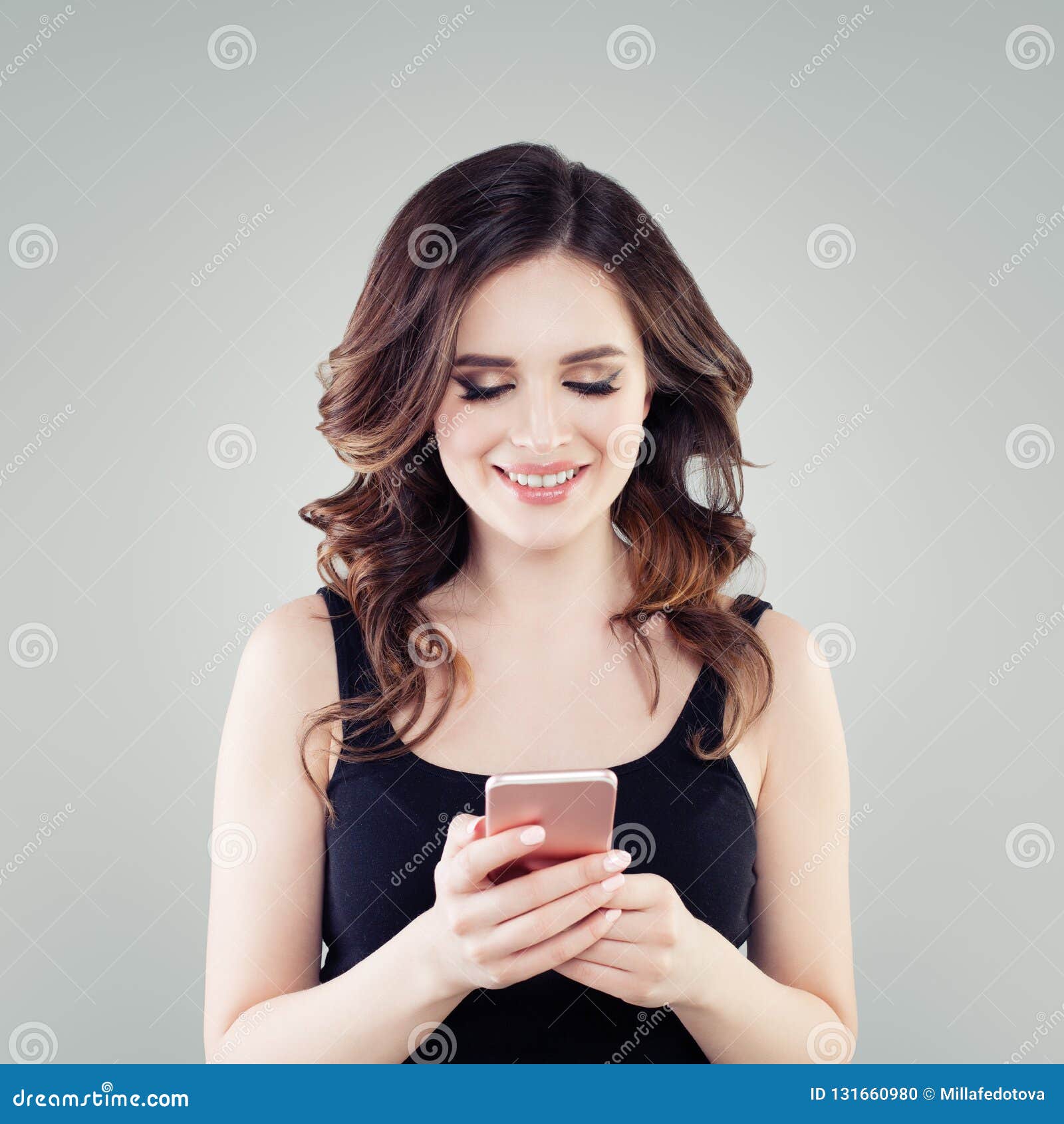 Happy Woman with Smartphone Texting. Girl Cell Phone Stock Photo ... Happy Woman with Smartphone Texting. Girl Cell Phone Stock Photo ...