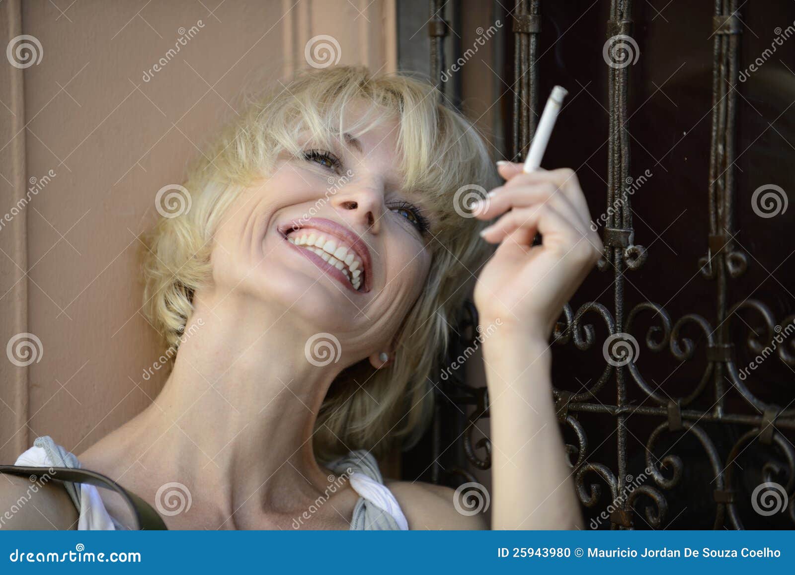 Happy Woman Smoking a Cigarette Stock Photo - Image of portrait, aged ...