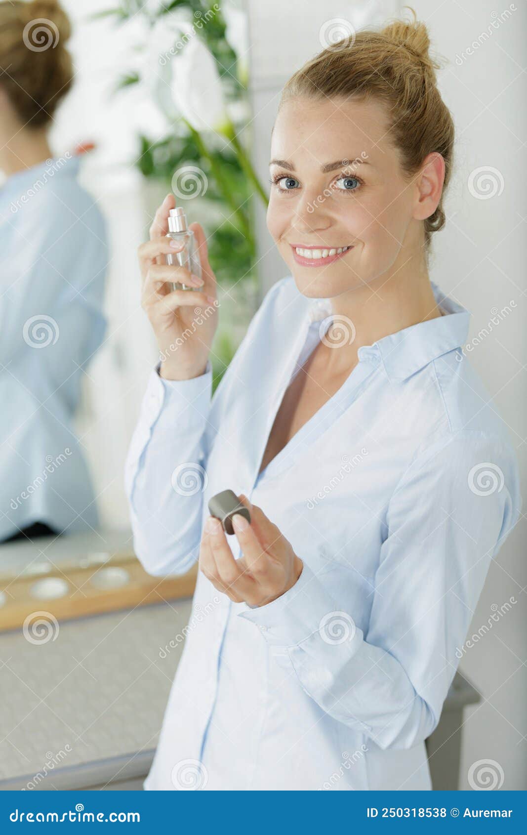 Happy Woman Spraying Perfume Stock Photo - Image of smile ...
