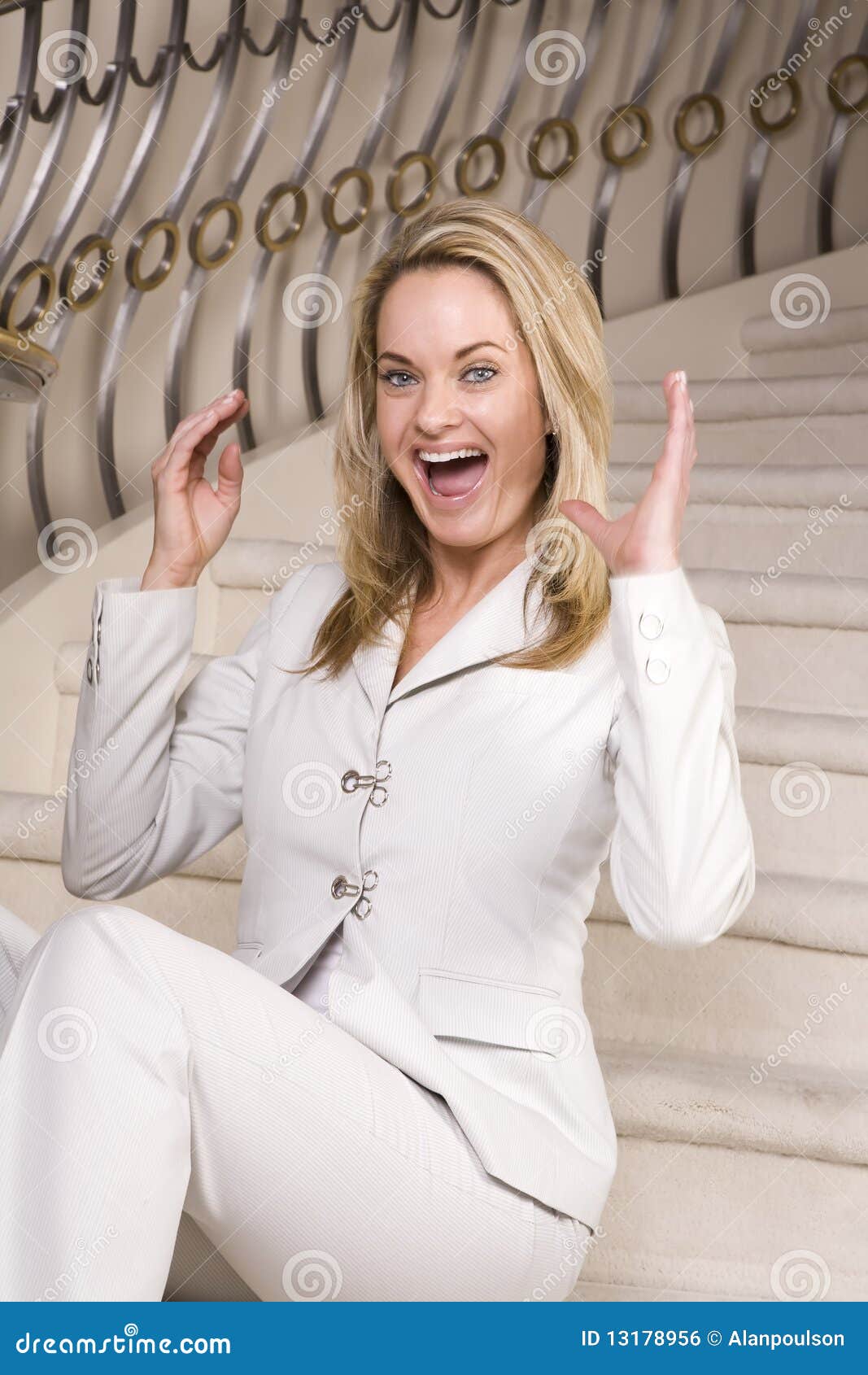 Happy woman on stairs stock photo. Image of suit, female - 13178956