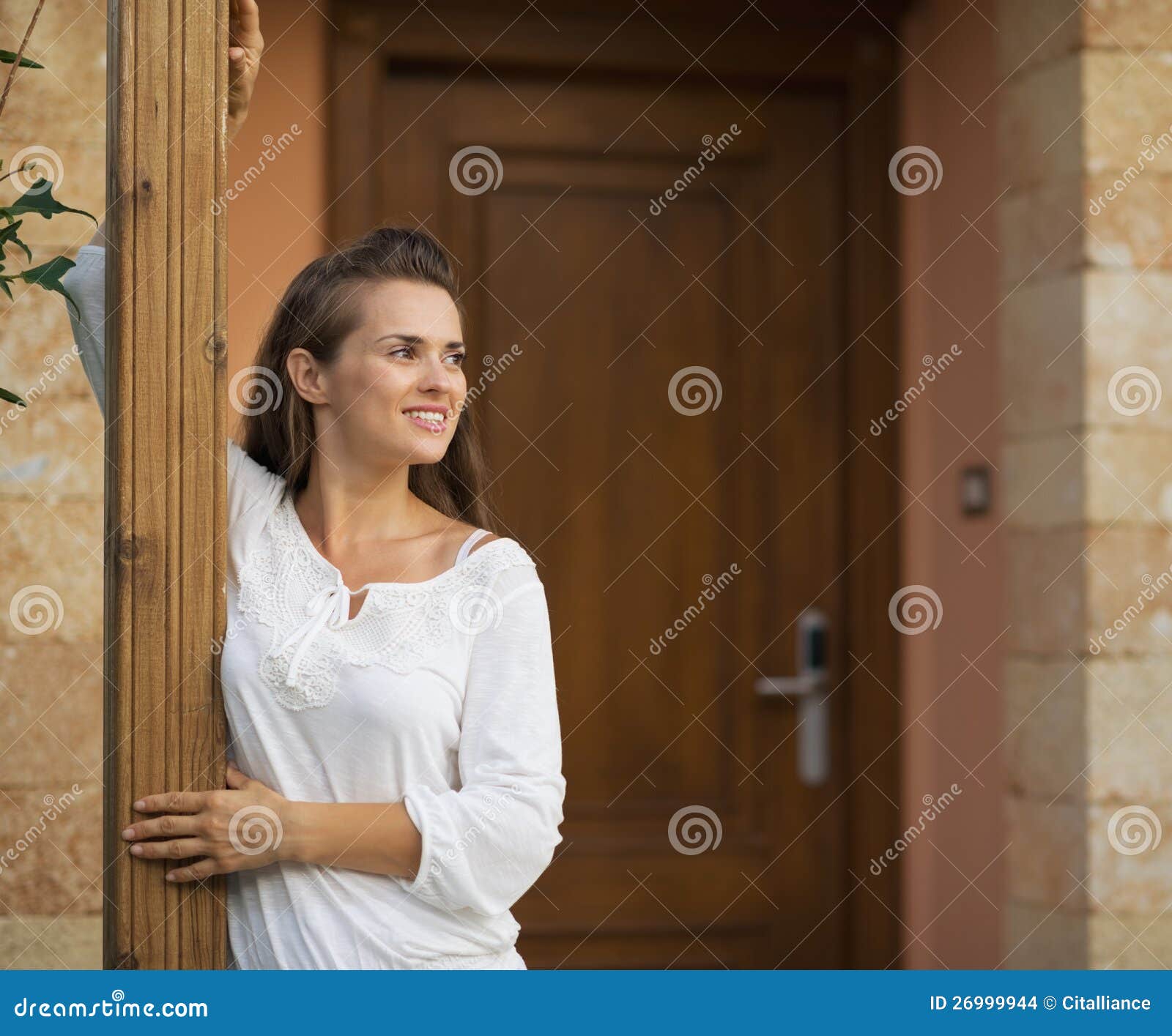Happy Woman Standing on Doorstep Stock Photo - Image of happy, pleasure ...