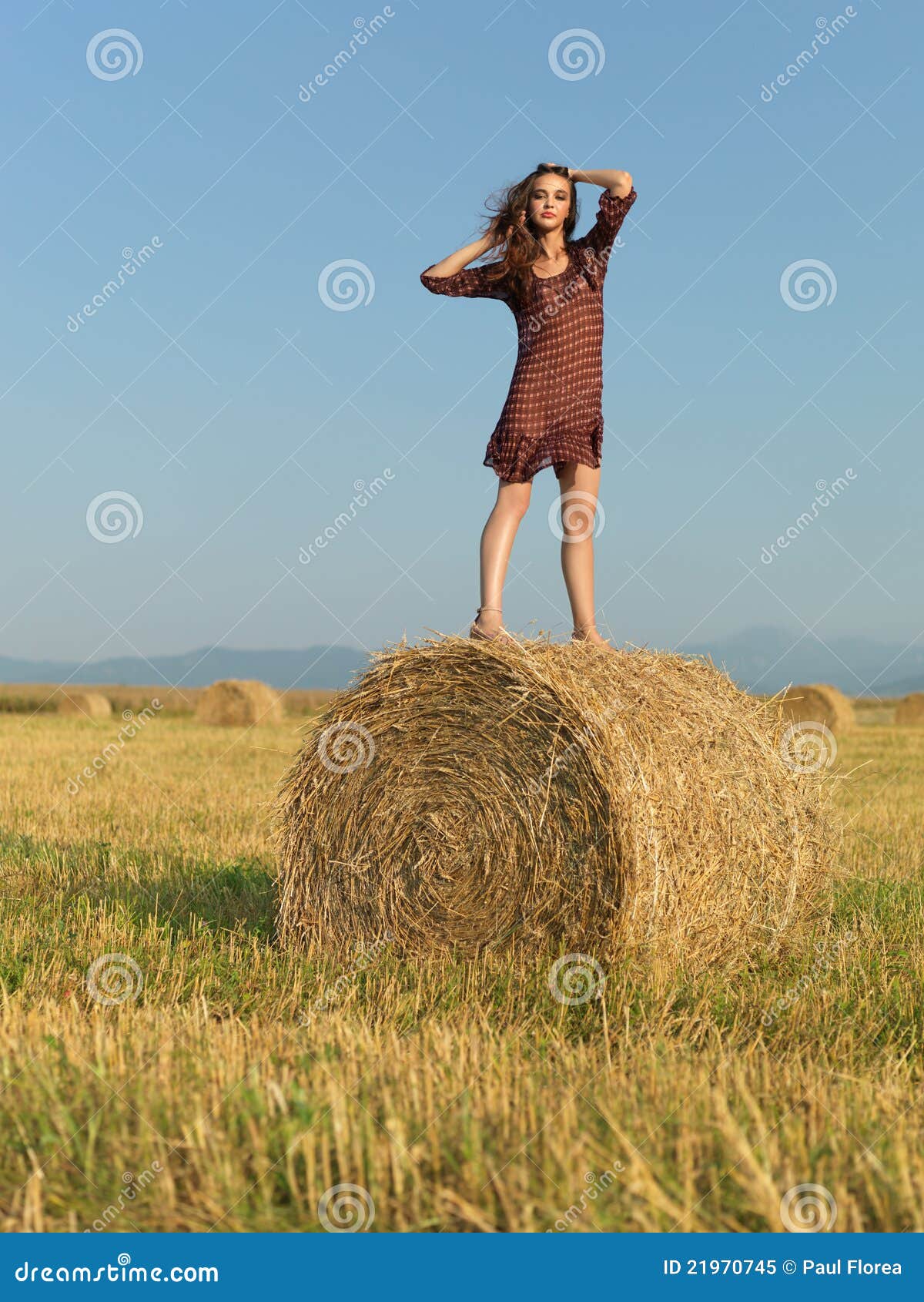 Happy Woman Standing on a Hay Stack Stock Image - Image of dress ...