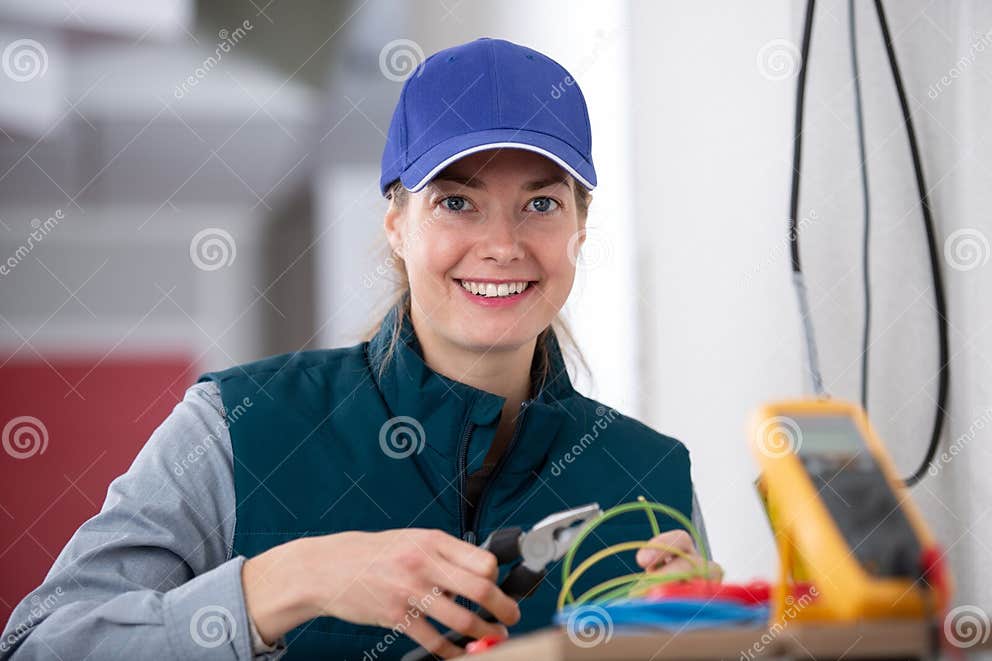Happy Woman Technician Smiling at Camera Stock Image - Image of blonde ...
