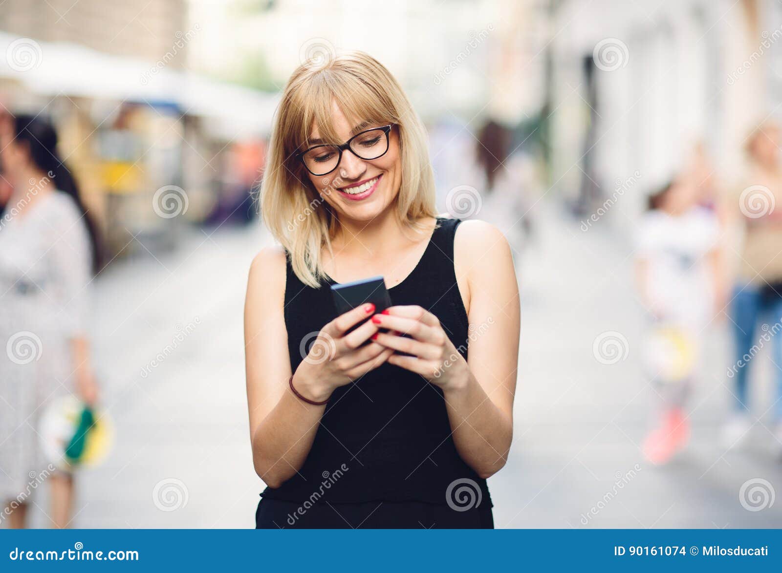 Happy Woman Texting on Her Smartphone Stock Photo - Image of mobile ... Happy Woman Texting on Her Smartphone Stock Photo - Image of mobile ...
