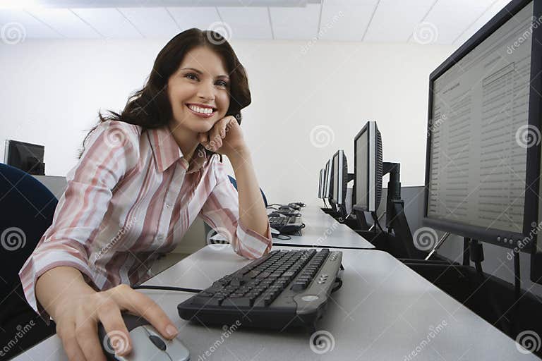 Happy Woman Using Computer stock image. Image of portrait - 29659309