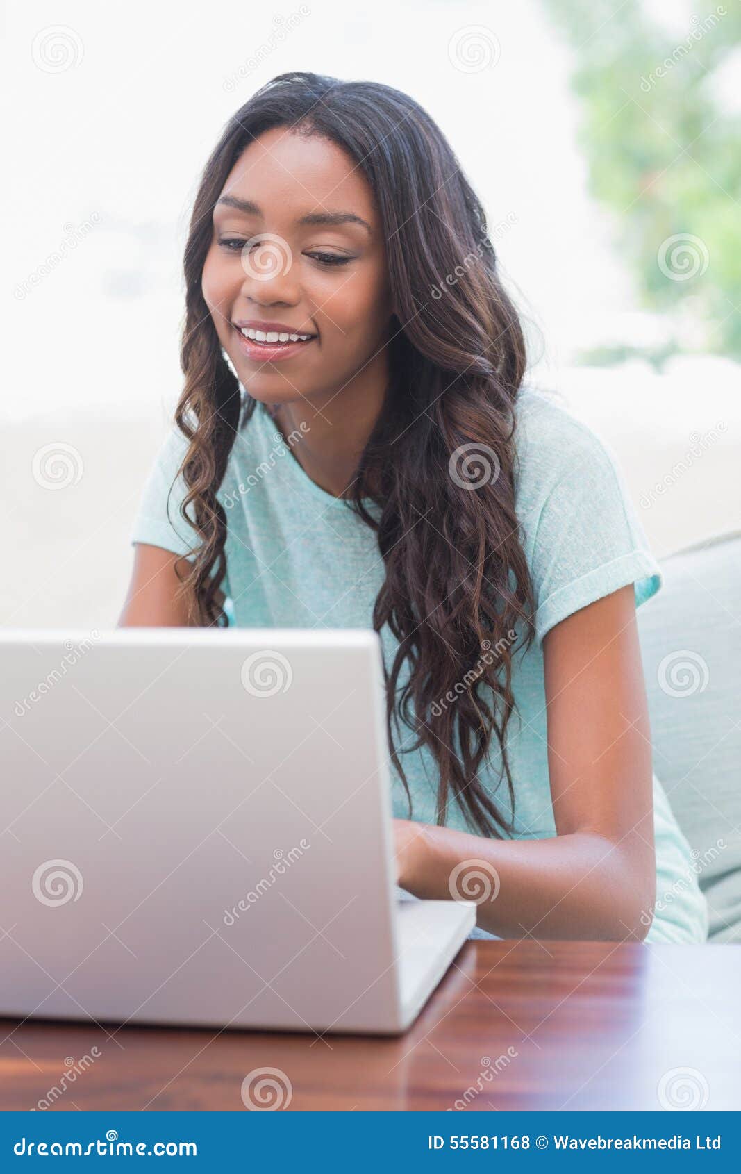 Happy Woman Using Her Laptop Stock Photo - Image of relaxing, house ...