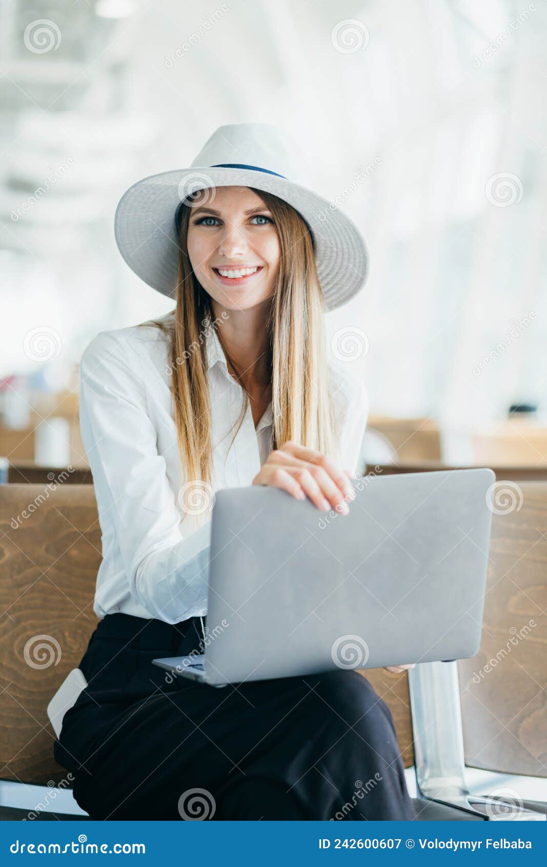 Happy Woman Using Laptop Computer at Airport Stock Image - Image of ...
