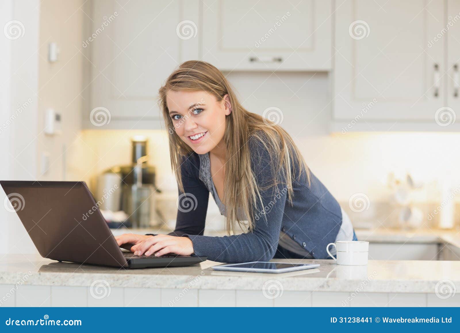 Happy woman using laptop stock image. Image of notebook - 31238441